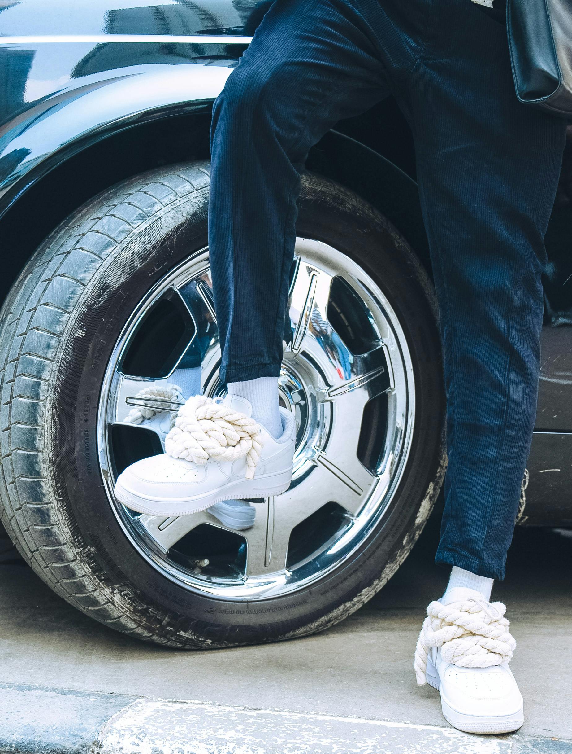 Man with Rope on White Nike Sneakers · Free Stock Photo
