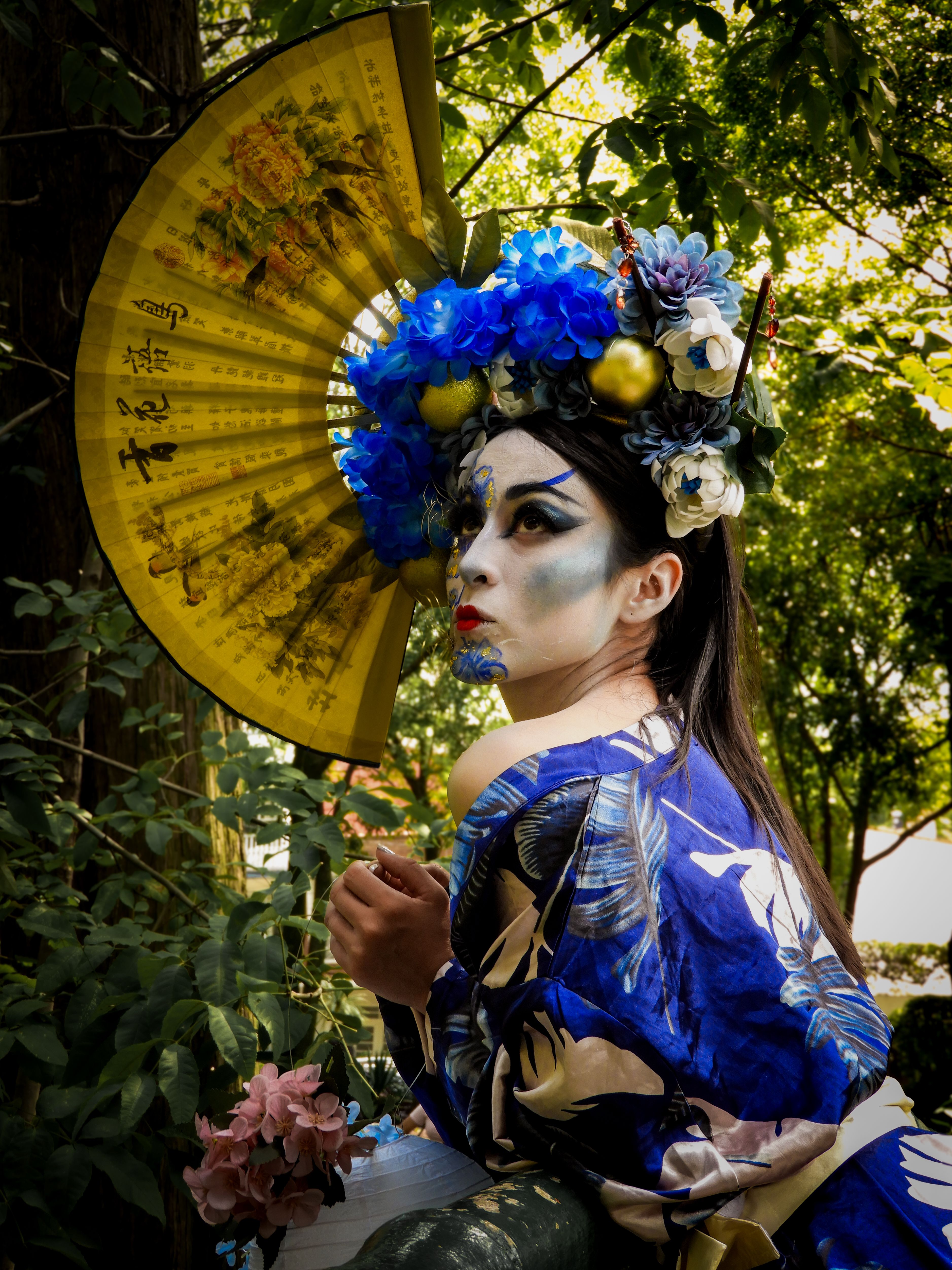 Modern Geisha in Vibrant Costume with Yellow Fan · Free Stock Photo
