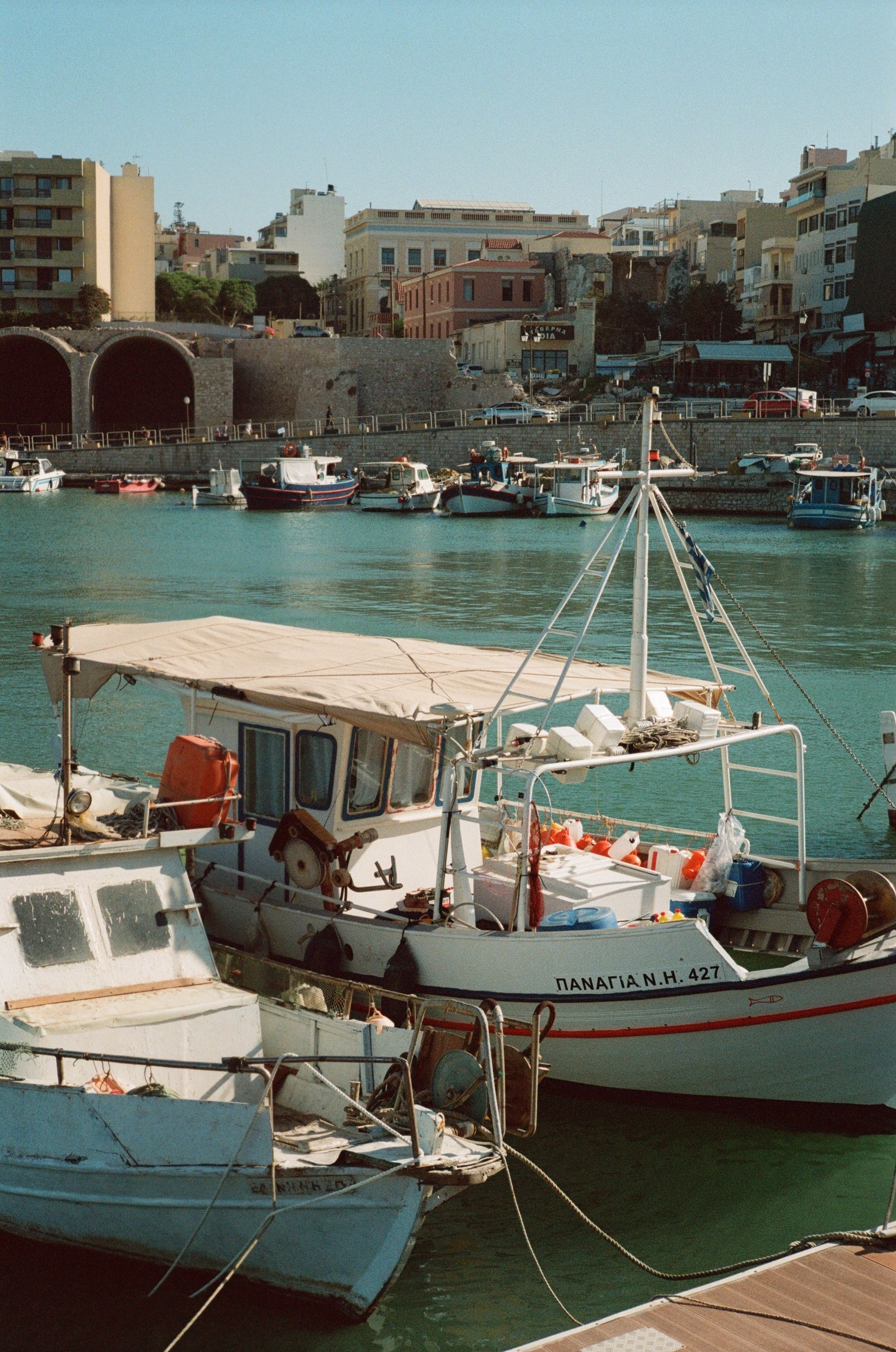 Scenic View of Fishing Boats in Mediterranean Harbor · Free Stock Photo