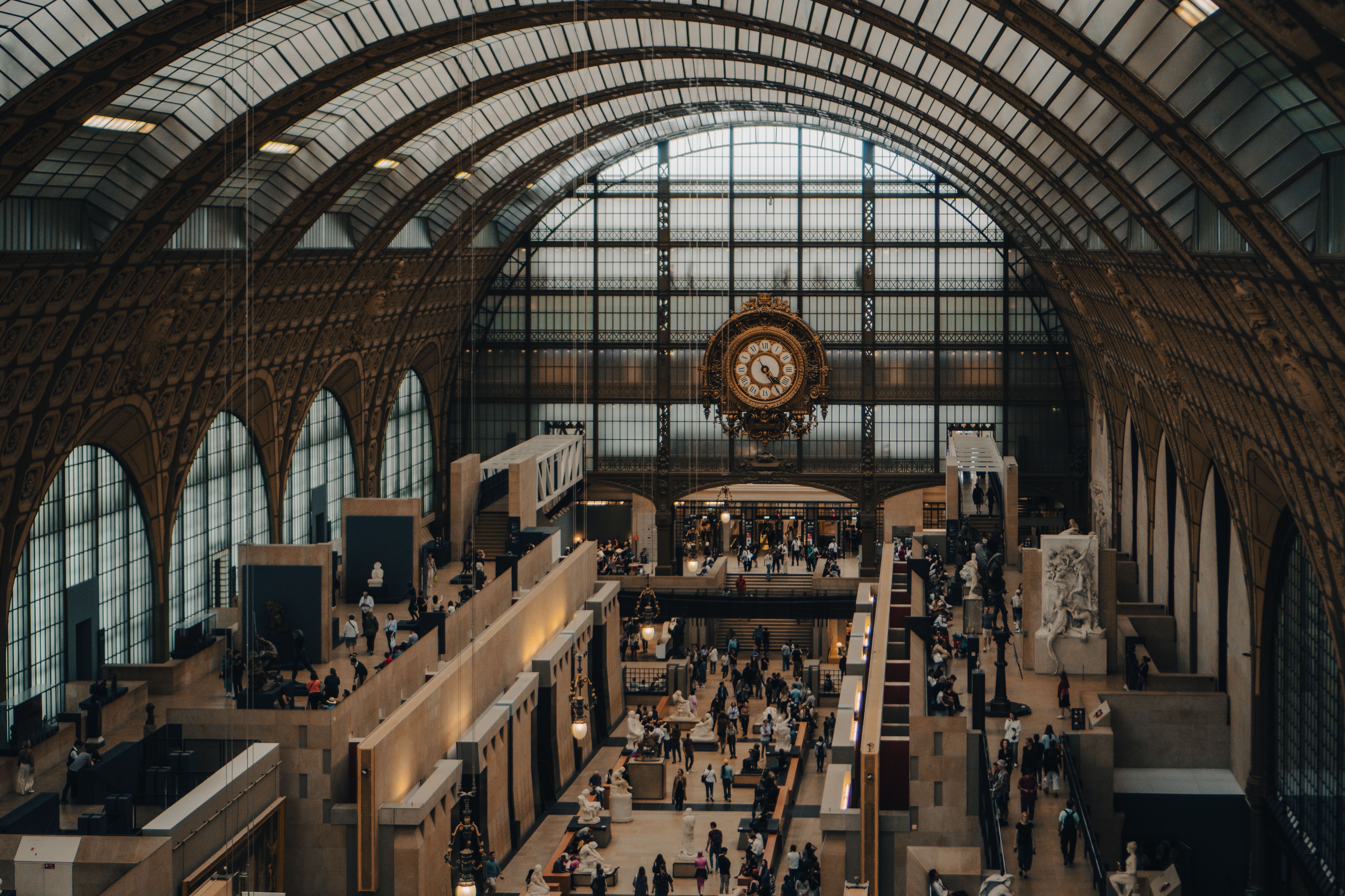 The inside of a large building with people walking around · Free Stock ...