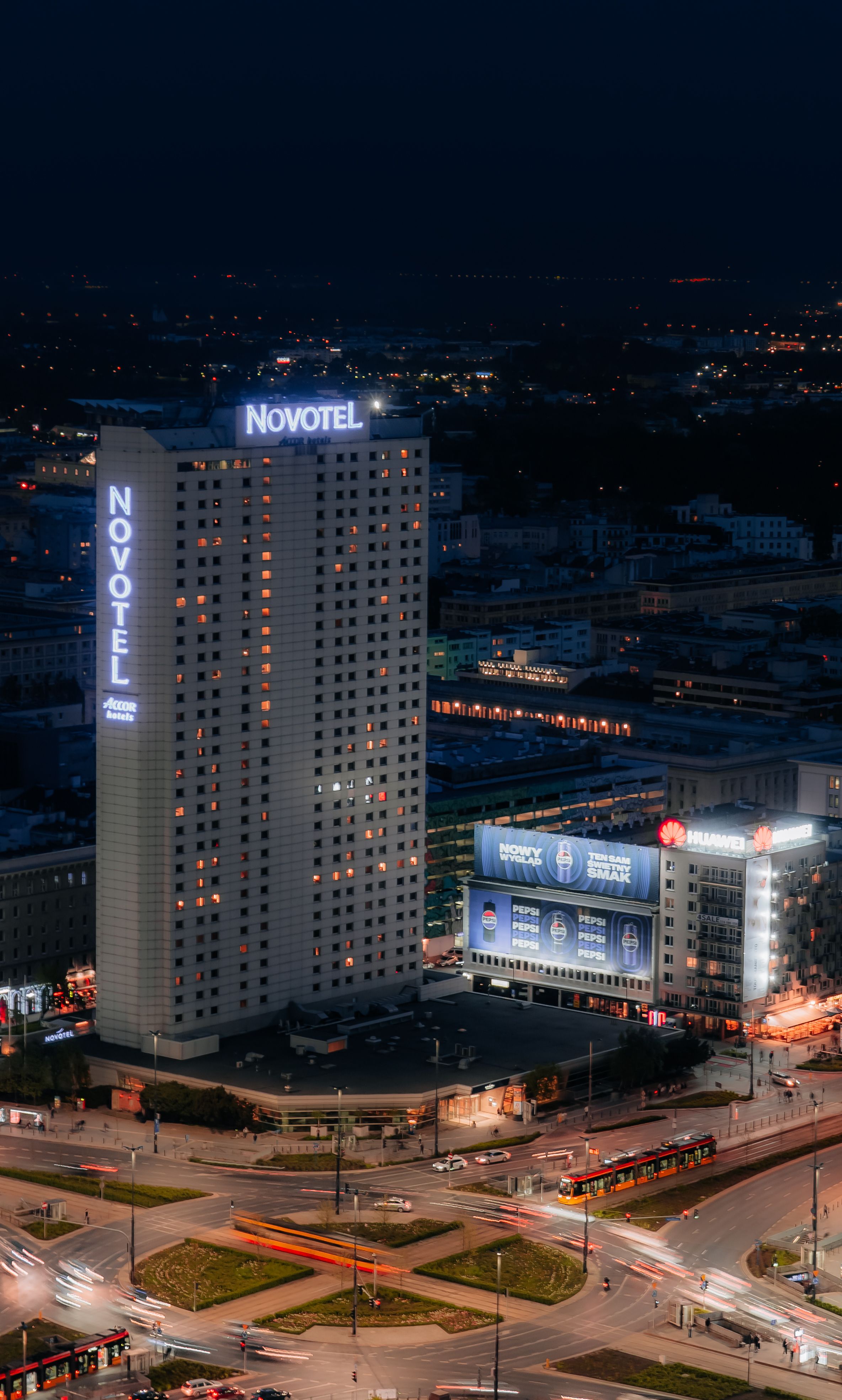 Novotel Hotel by Roman Dmowski Roundabout in Warsaw, Poland at Night ...