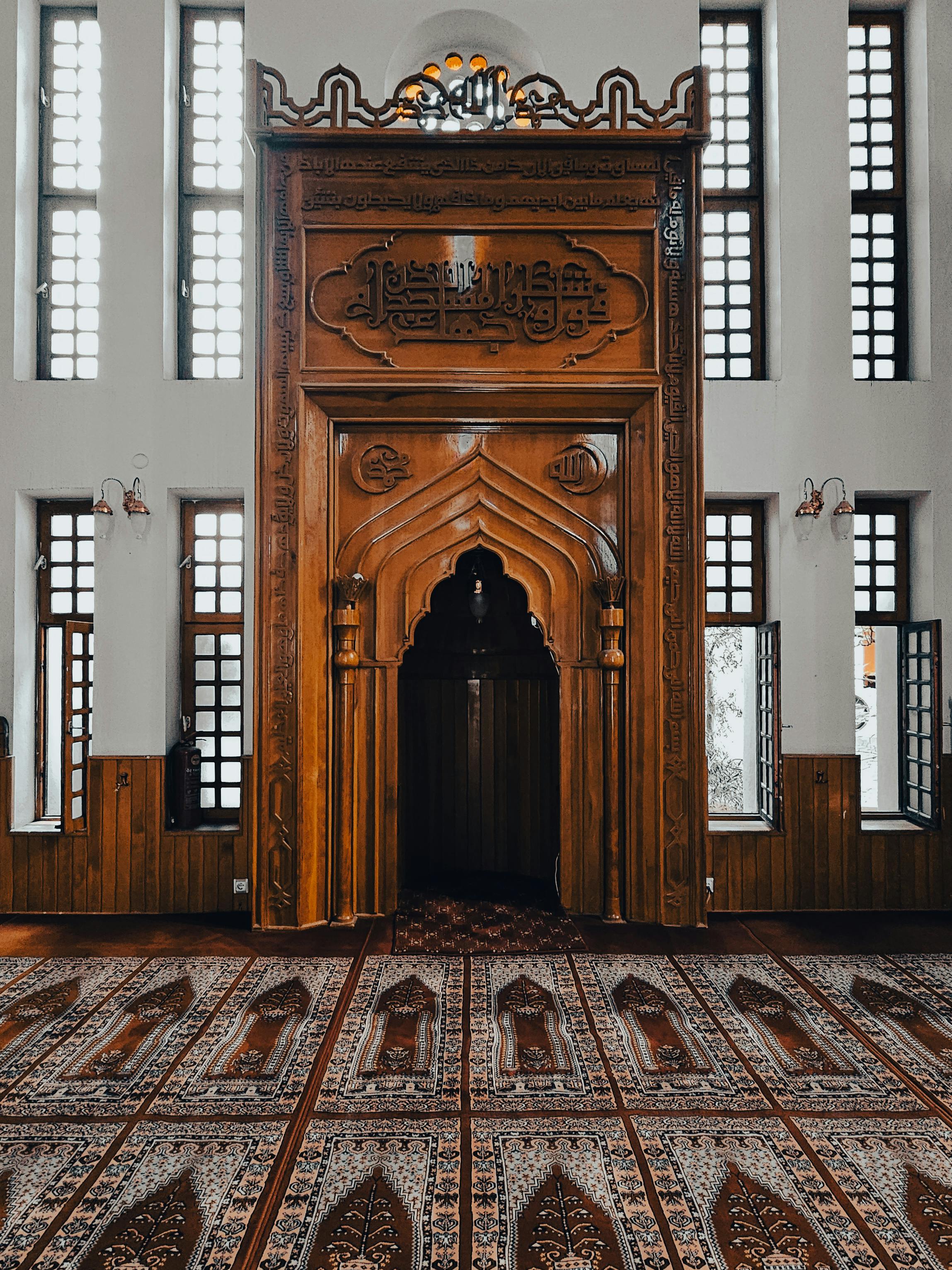 Ornate Wooden Mihrab in a Beautiful Mosque Interior · Free Stock Photo