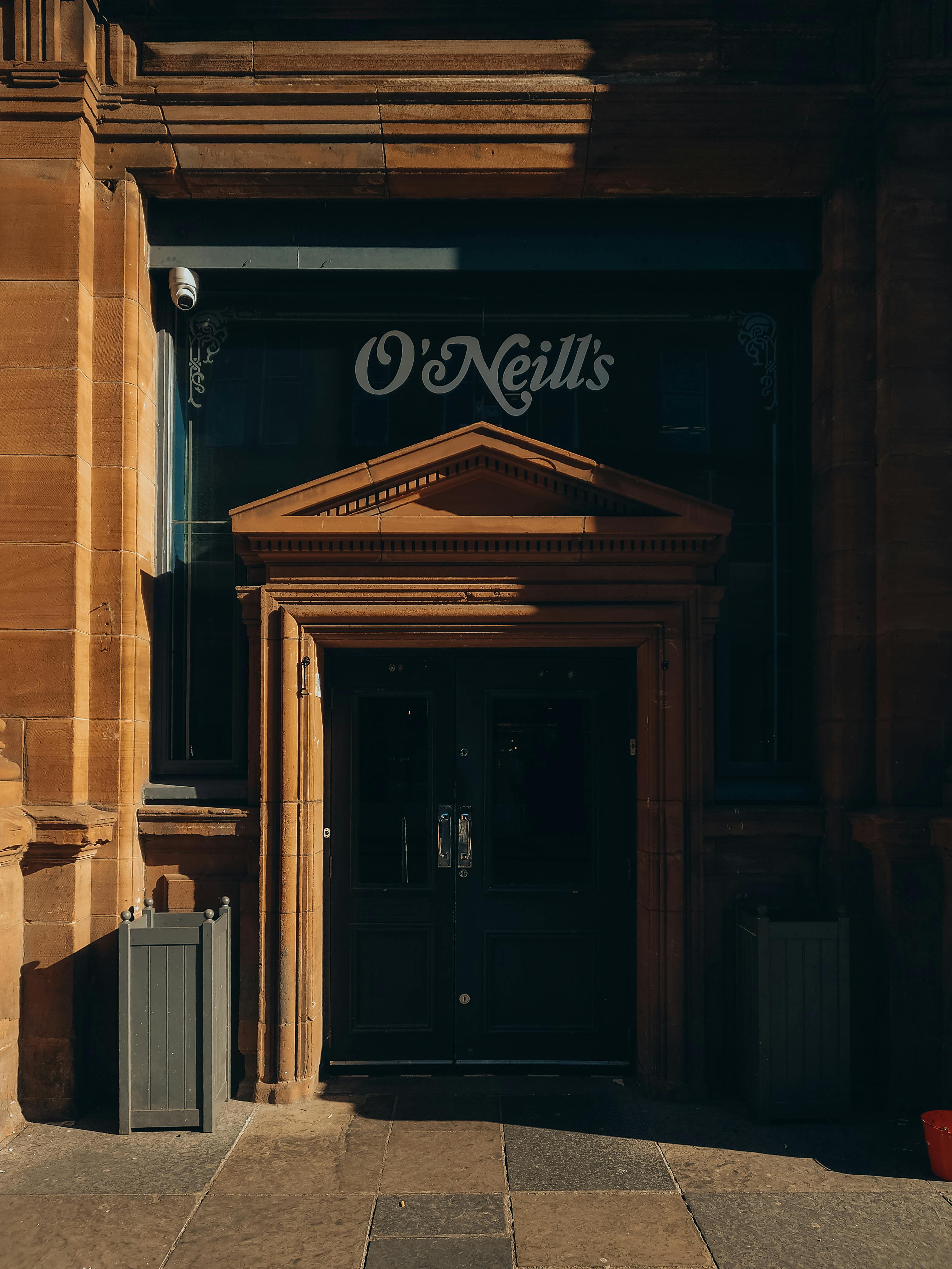 The entrance to a building with the words o'niel on it · Free Stock Photo