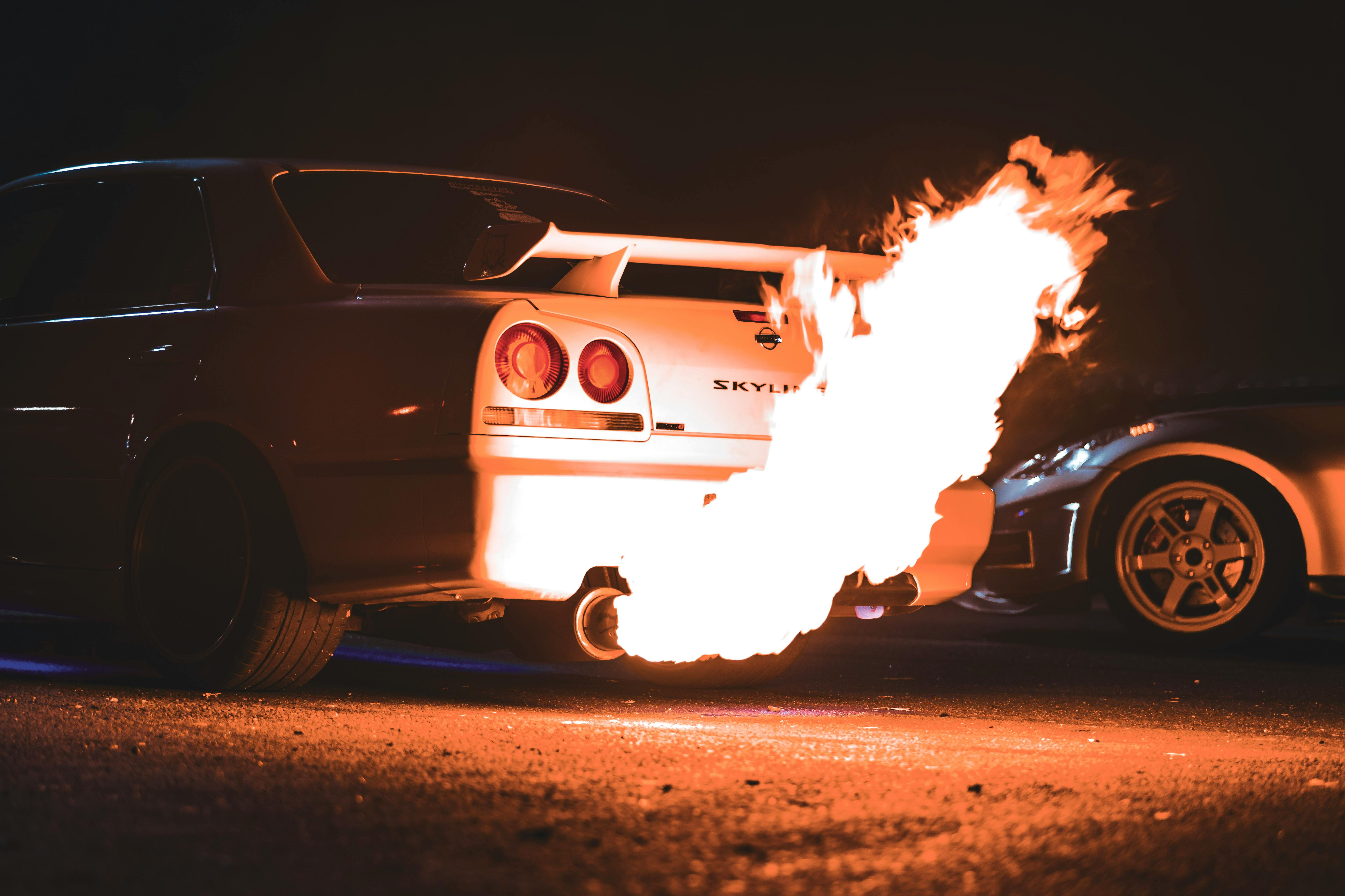Blue Nissan Skyline R34 GTR at Night · Free Stock Photo
