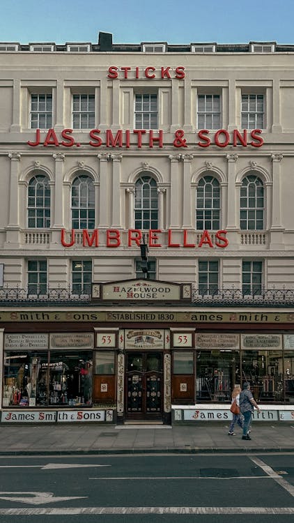 Old building with red typographic sign in London · Free Stock Photo Old building with red typographic sign in London · Free Stock Photo