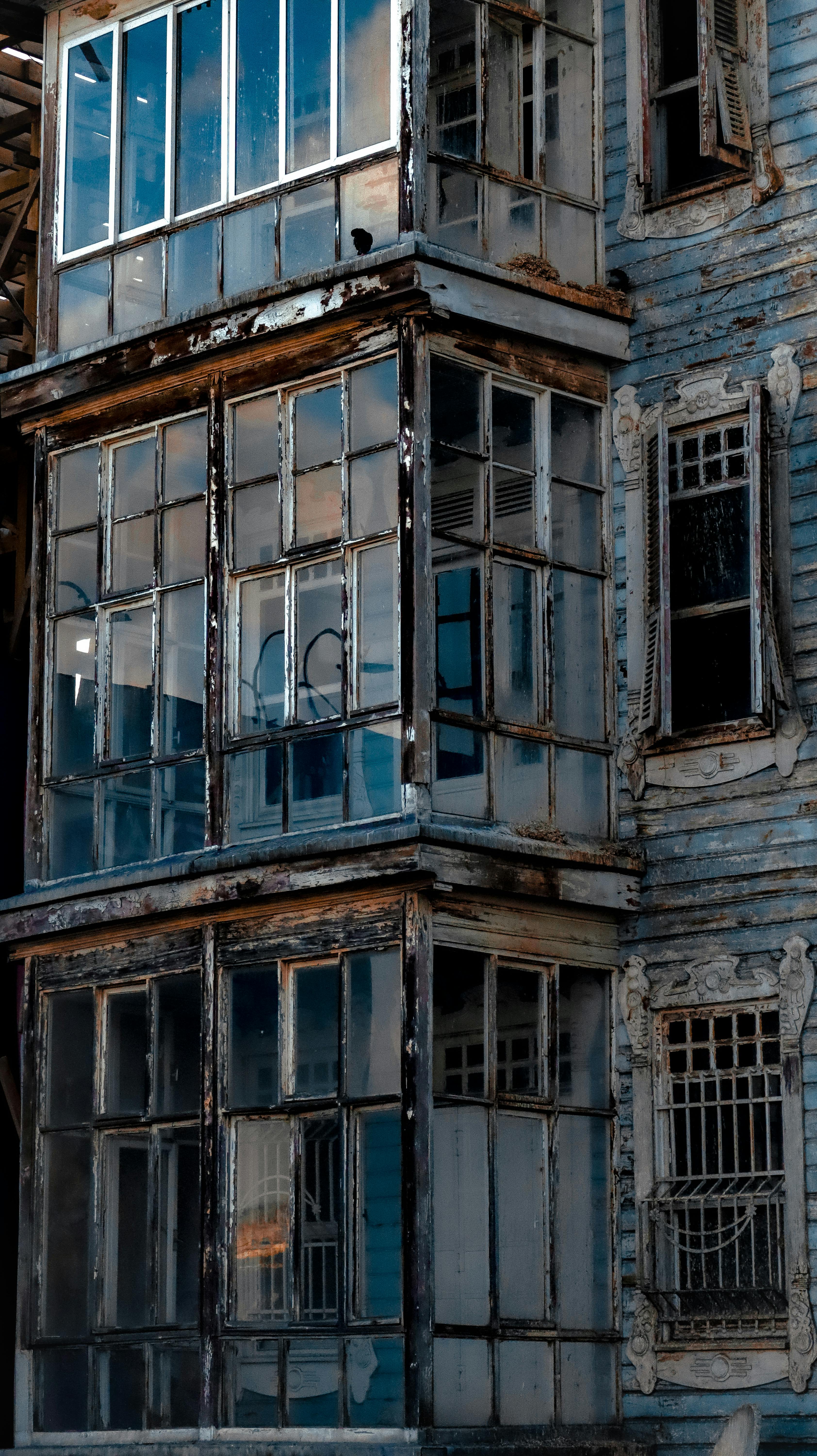 Rustic Vintage Building with Weathered Windows · Free Stock Photo