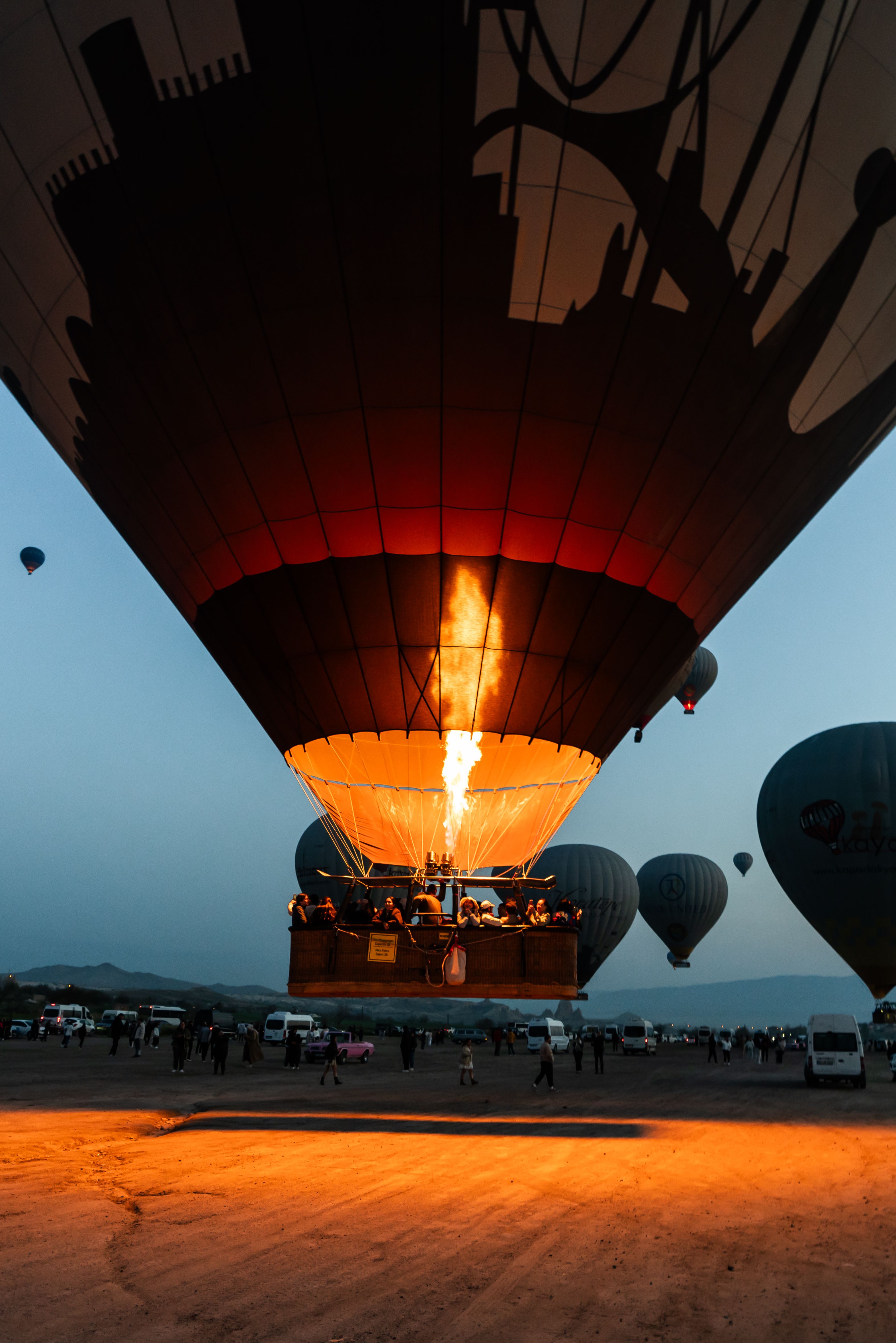 Hot Air Balloon Igniting at Dusk Adventure · Free Stock Photo