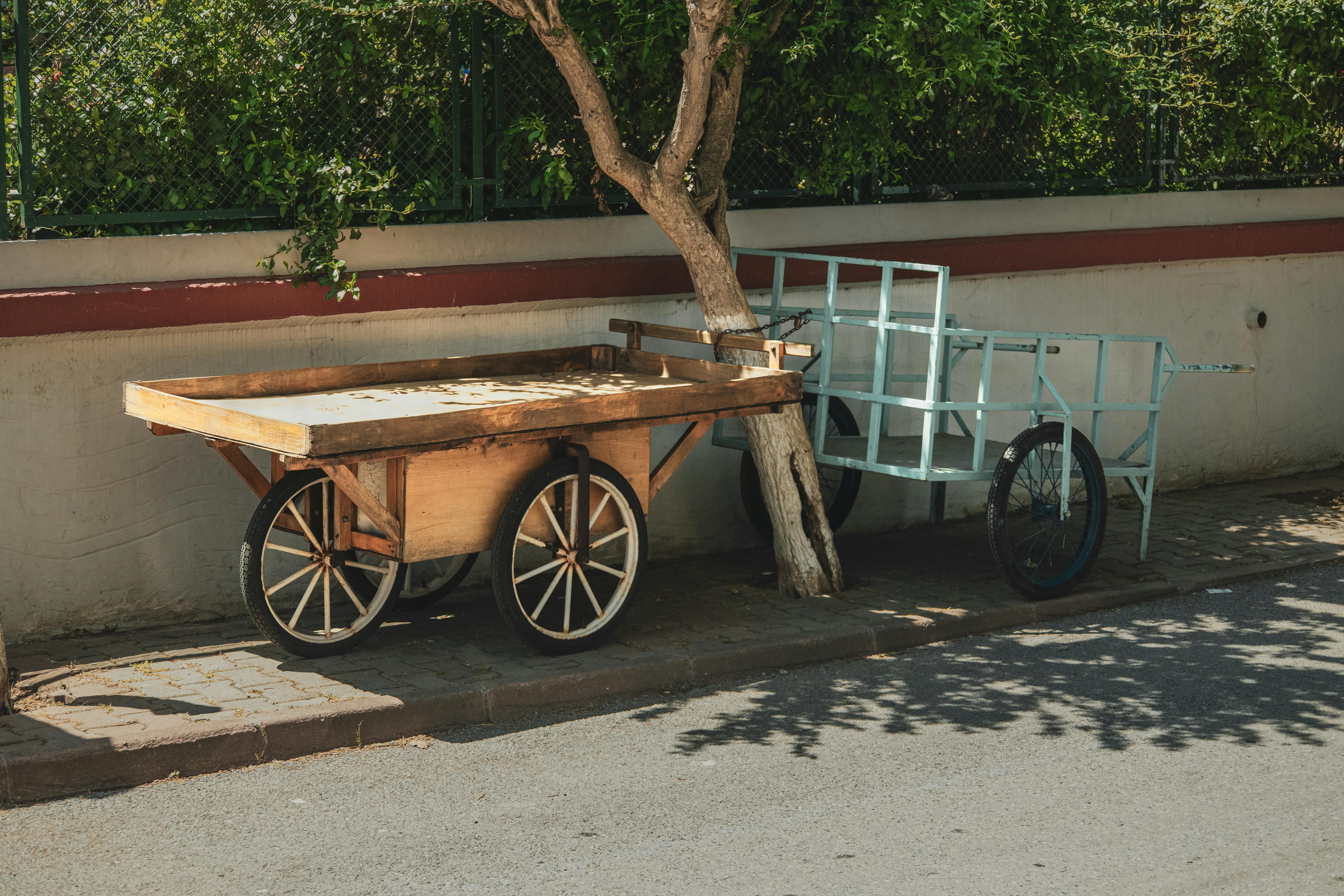 Vintage Carts in Sunny Street Corner · Free Stock Photo
