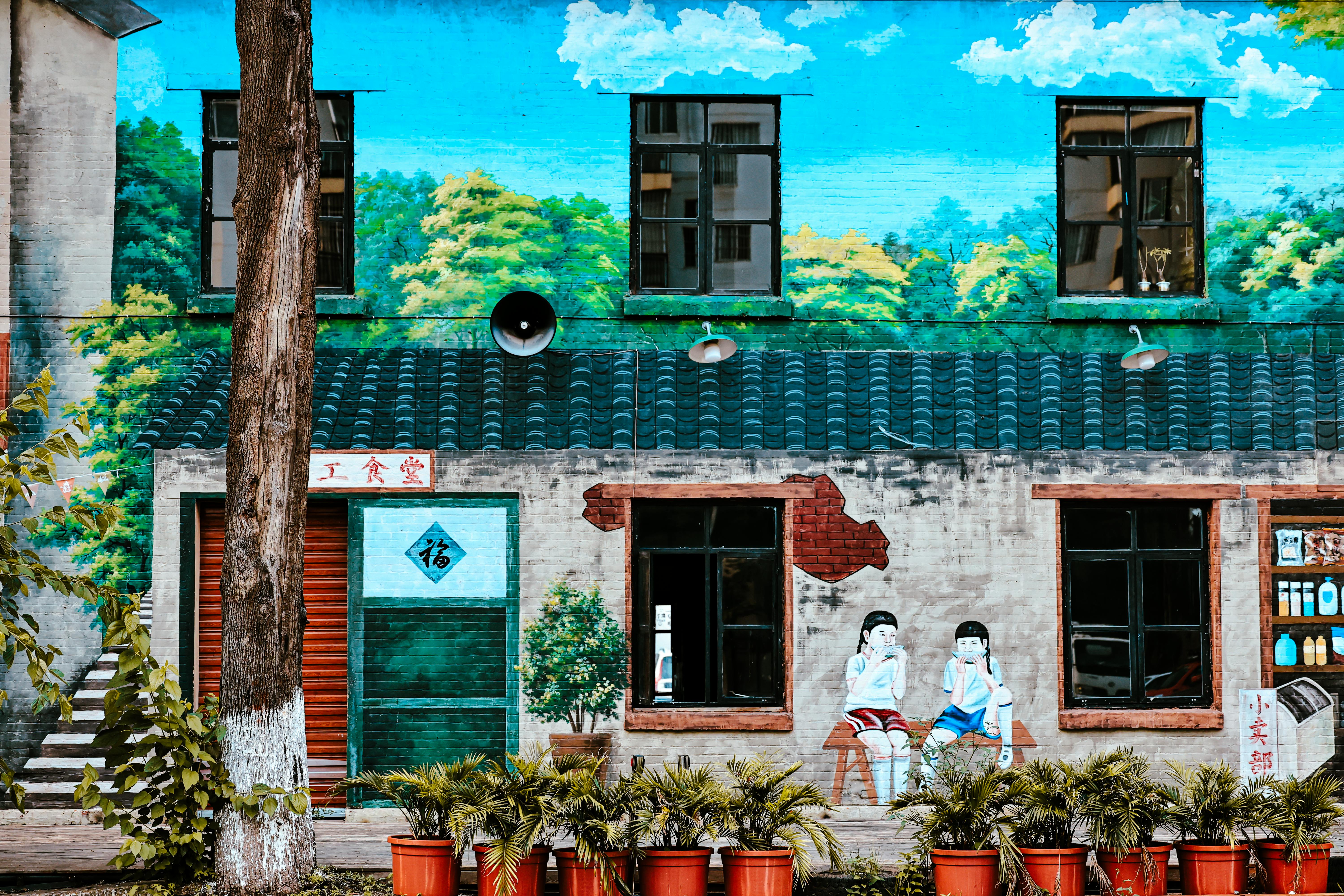 Colorful Street Art on Building Facade · Free Stock Photo