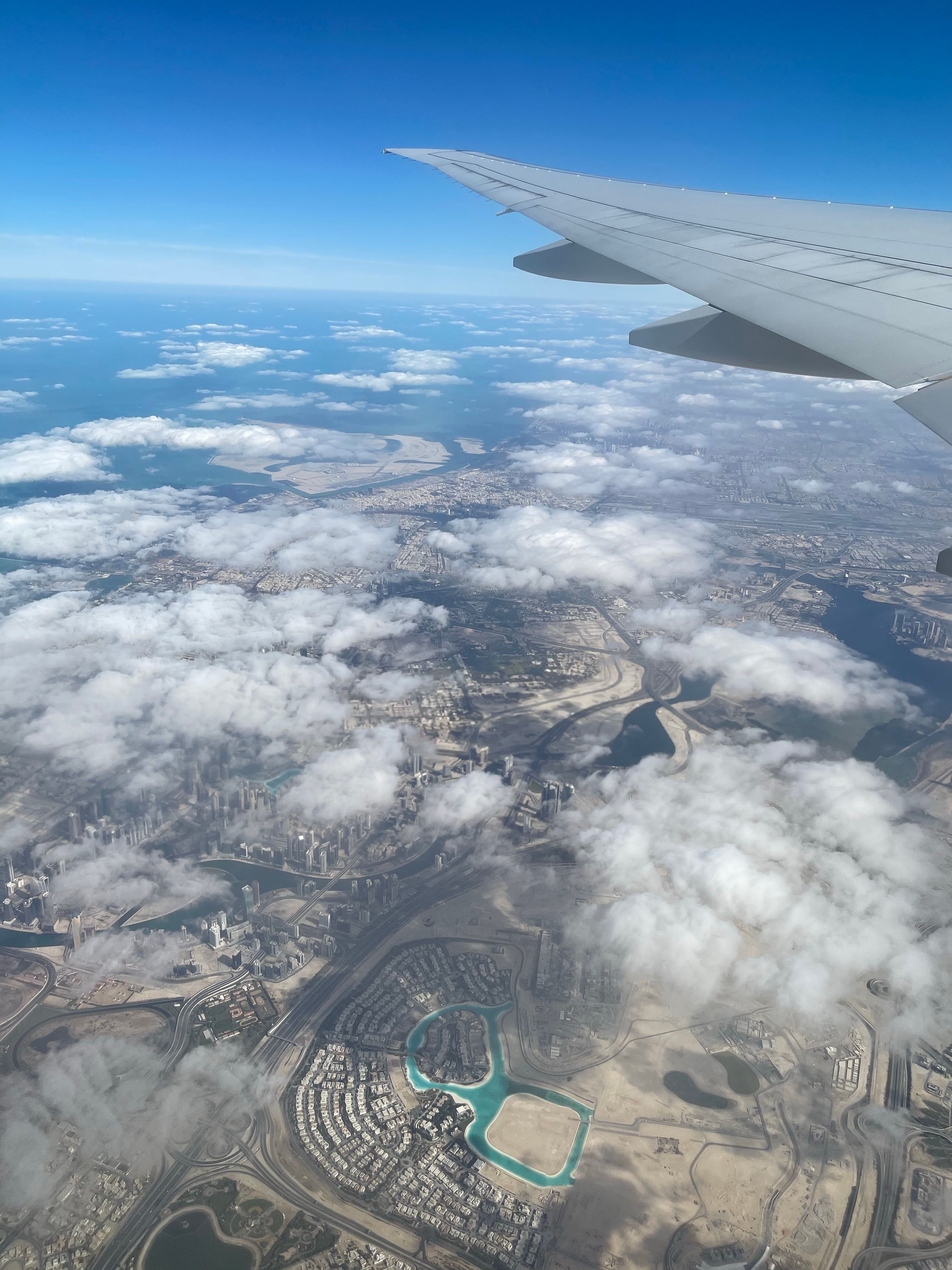 Aerial View of Dubai Cityscape from Airplane · Free Stock Photo