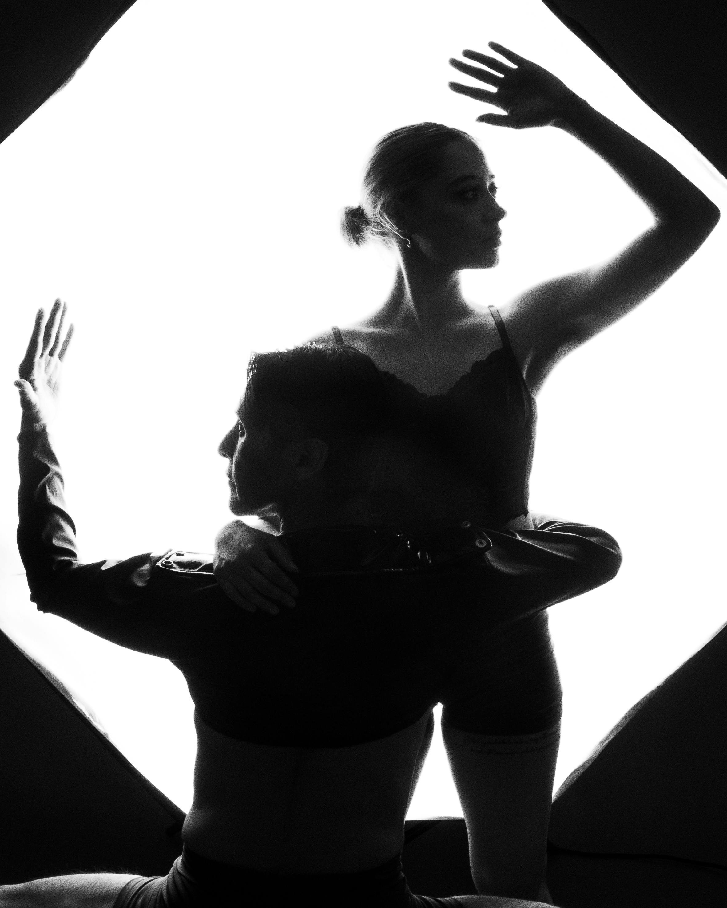 Silhouetted Contemporary Dance Duo in Motion · Free Stock Photo