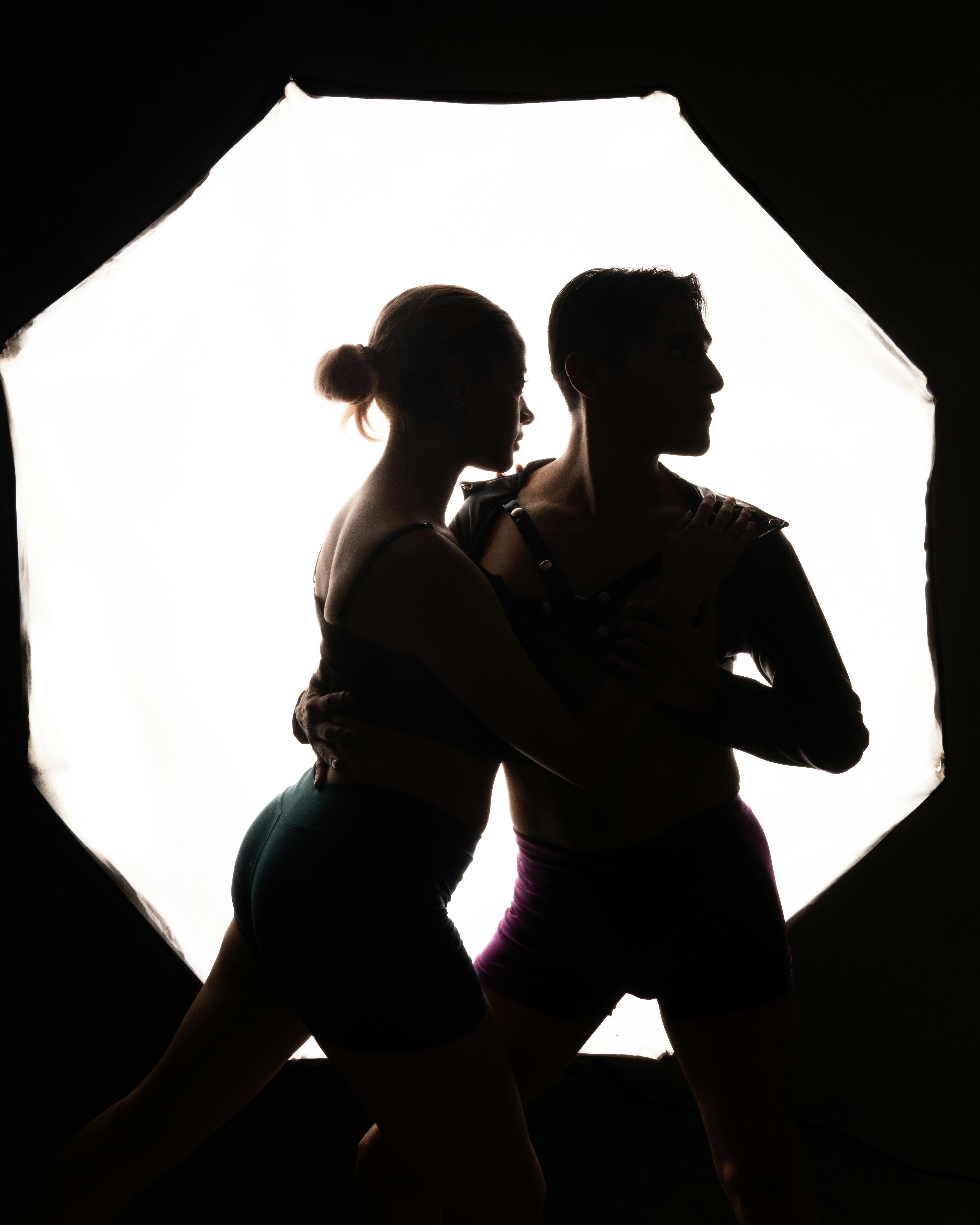 Silhouette of Dance Duo in Artistic Backlight · Free Stock Photo