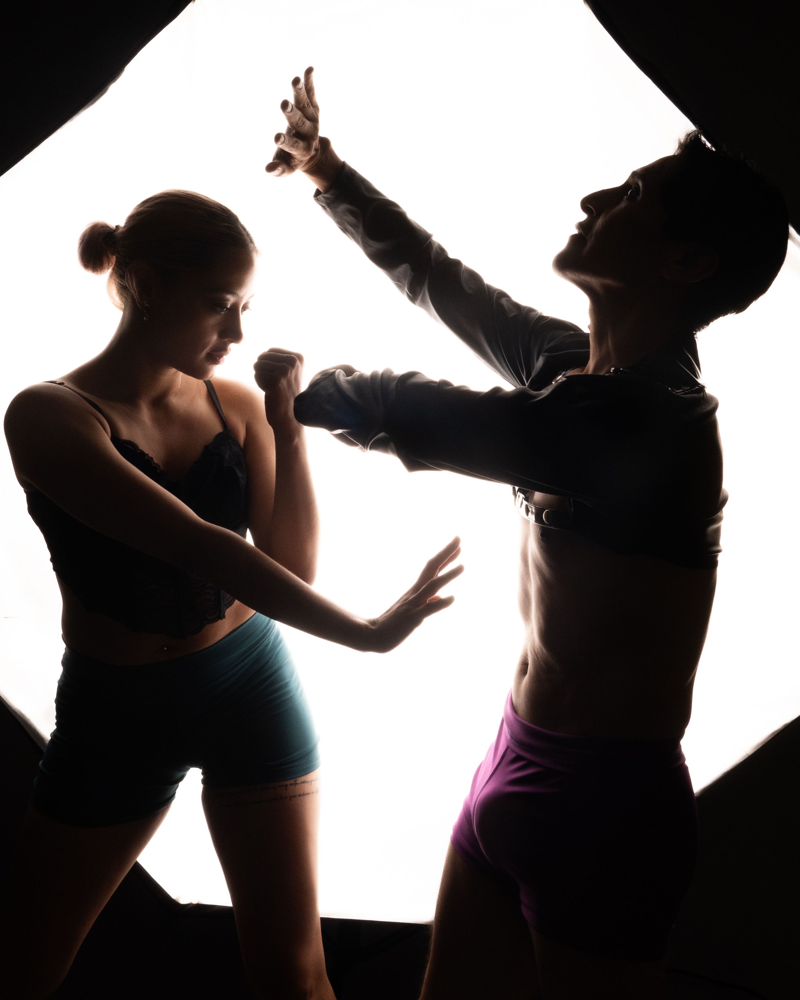 Dynamic Dance Silhouette of Two Performers · Free Stock Photo
