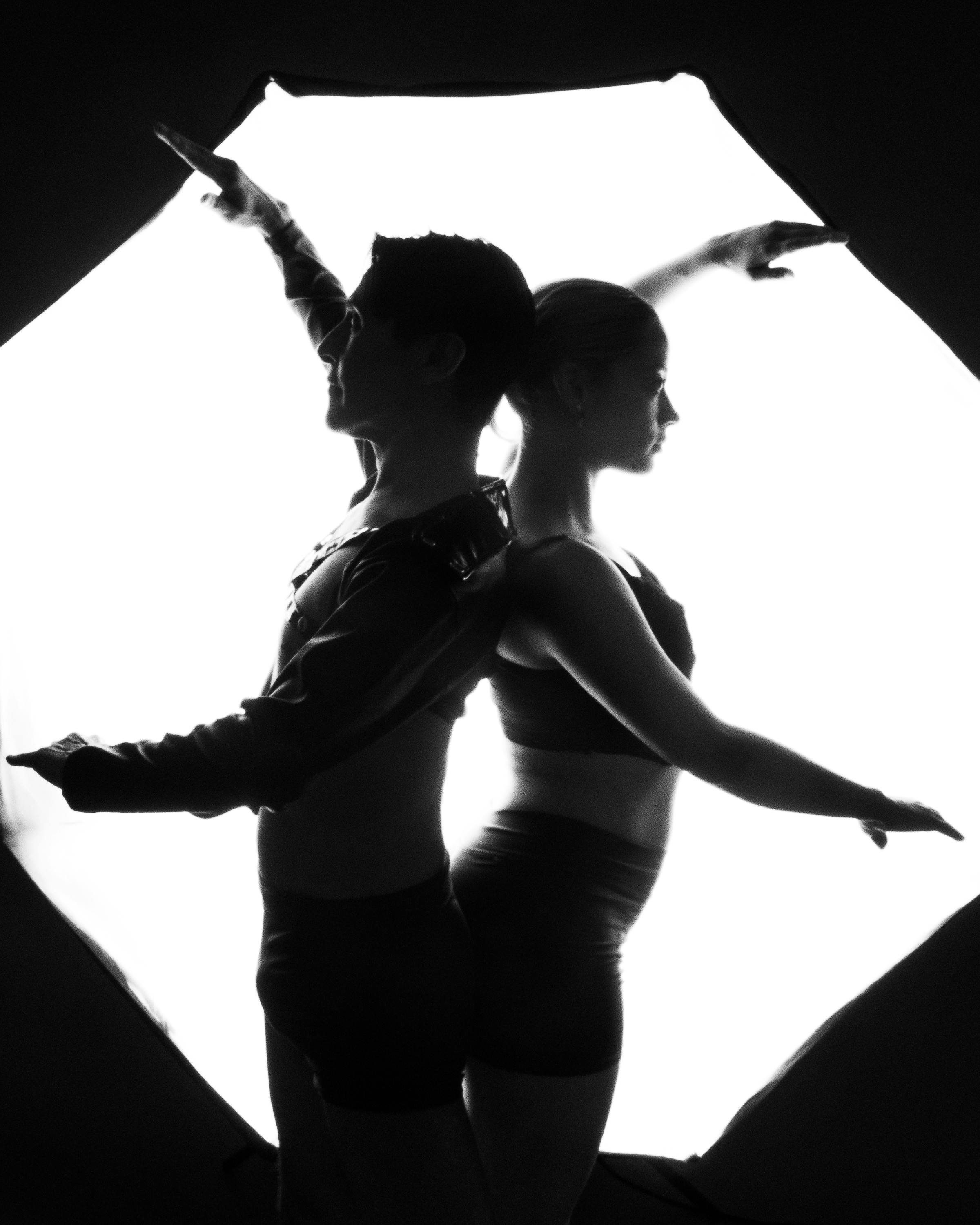 Dynamic Dance Duo in Artistic Silhouette · Free Stock Photo