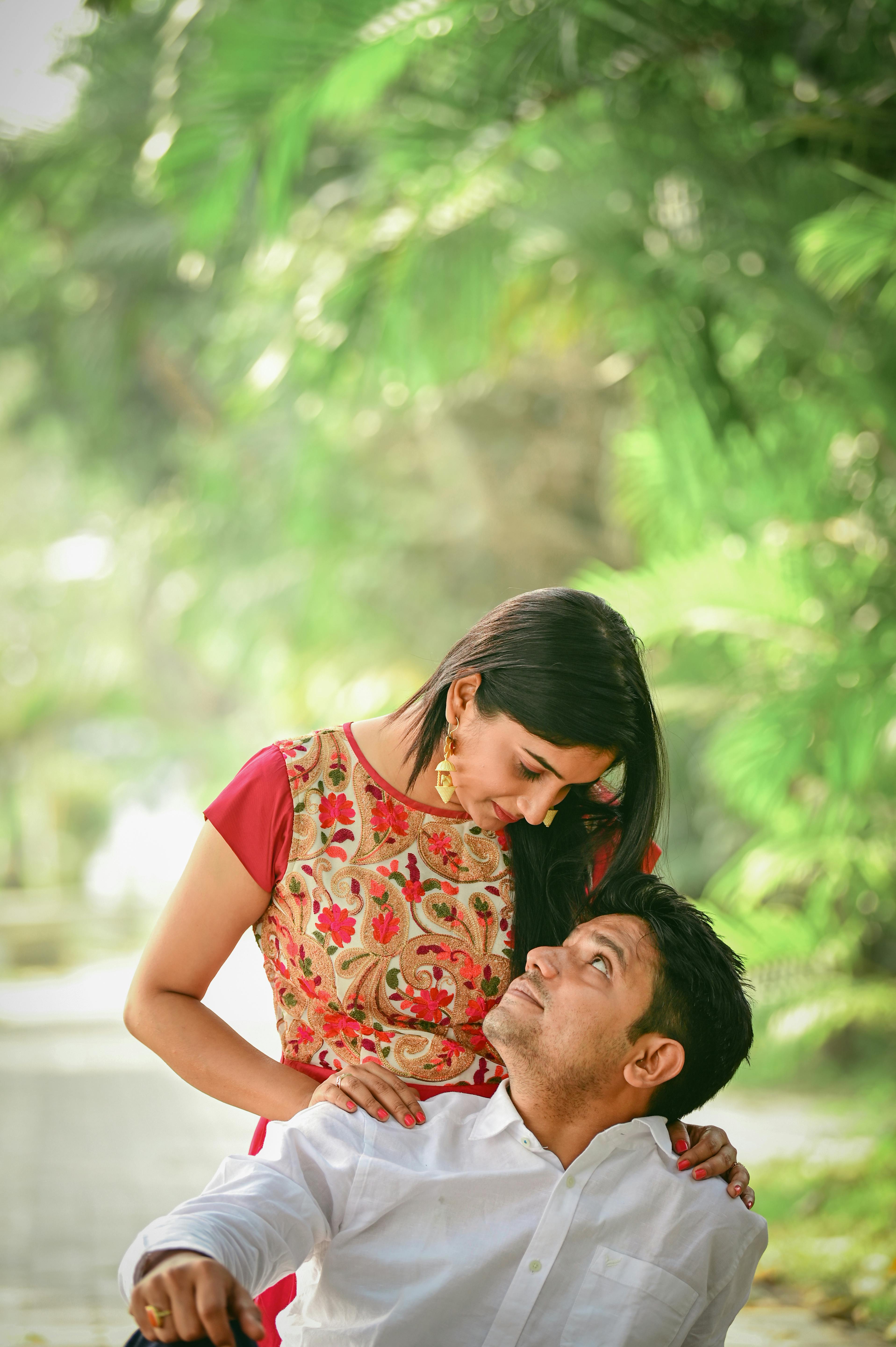 Romantic Couple Embracing by the Lakeside · Free Stock Photo