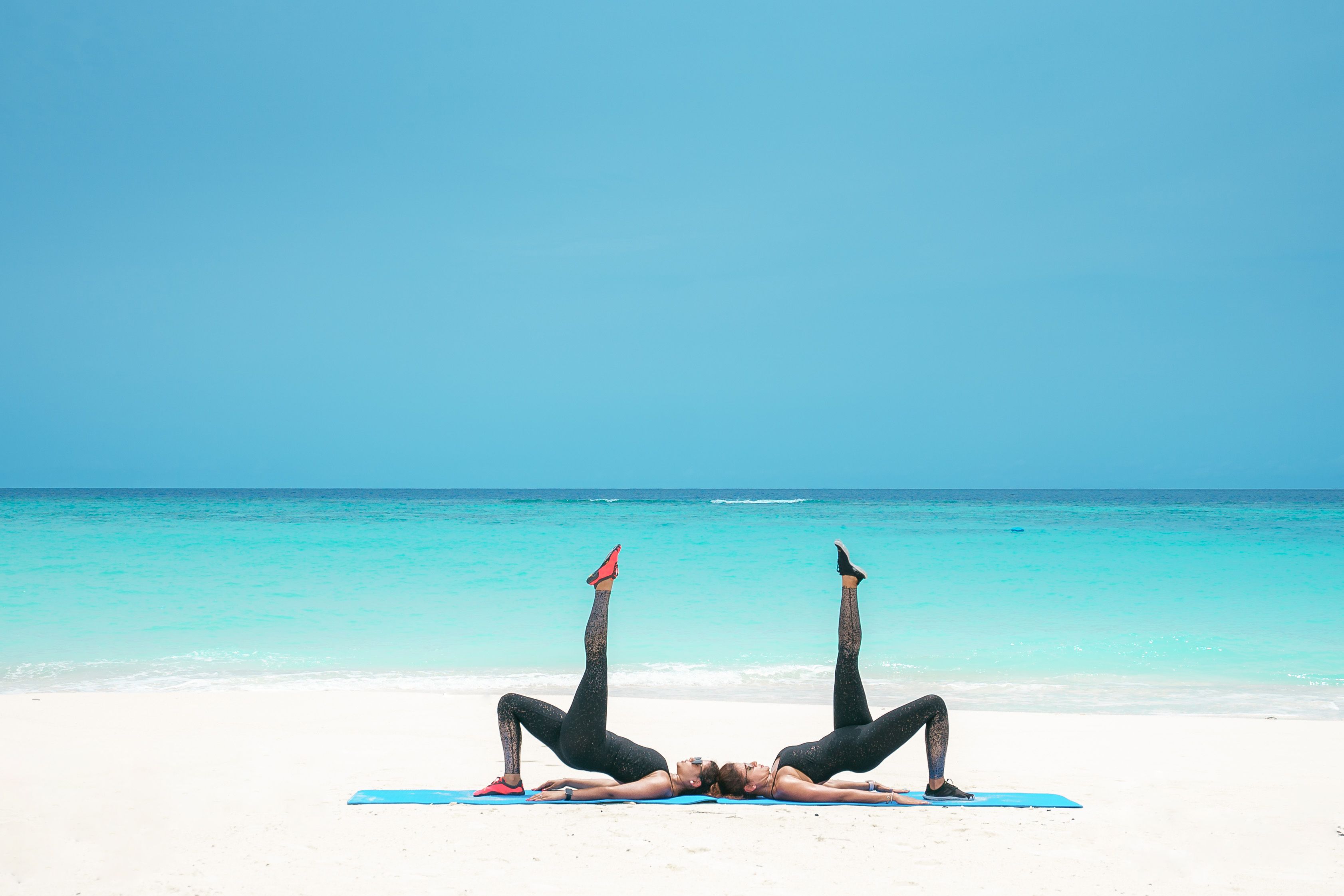 Beach Yoga Session with Stunning Ocean View · Free Stock Photo