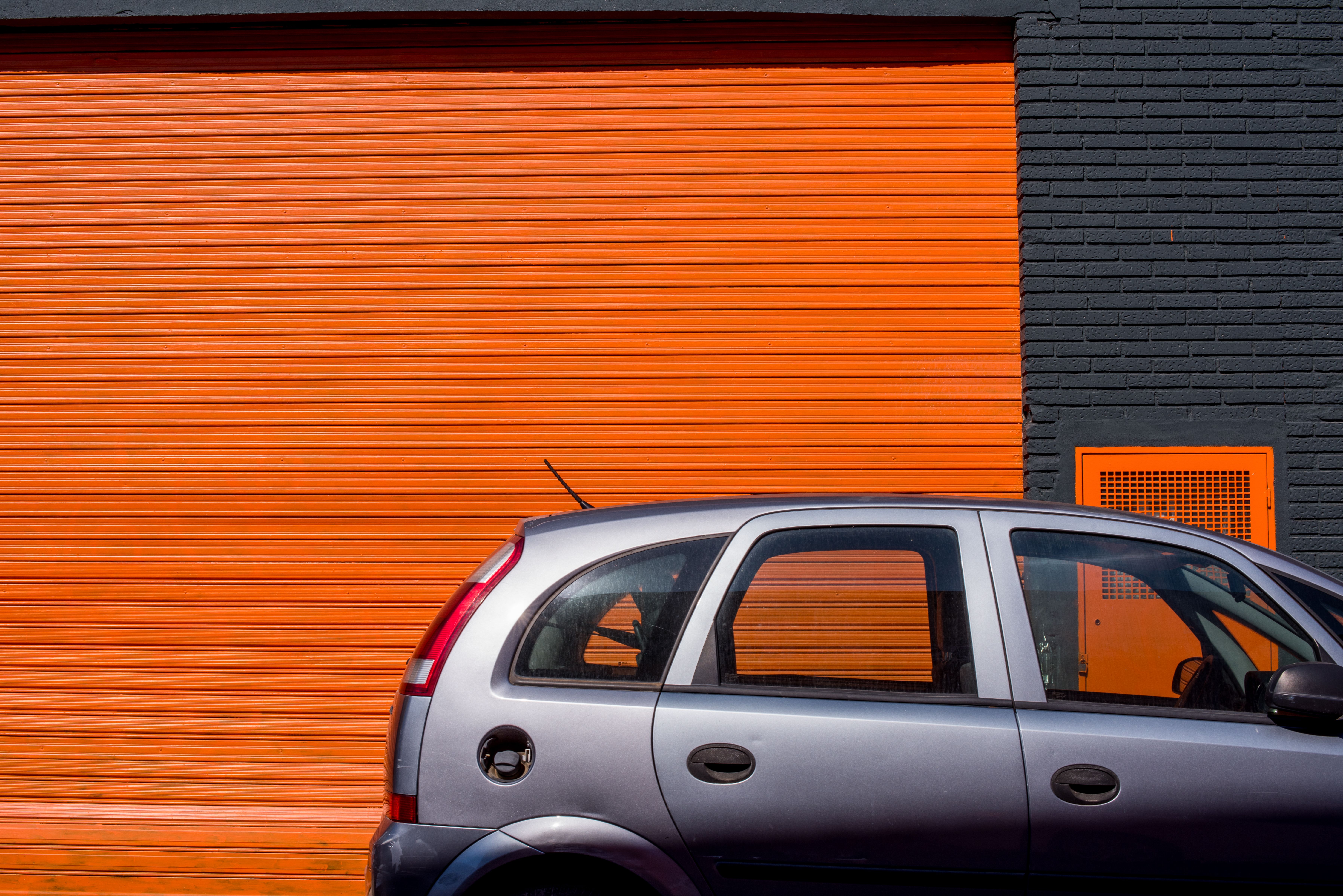 Modern Urban Car by Vibrant Orange Garage · Free Stock Photo