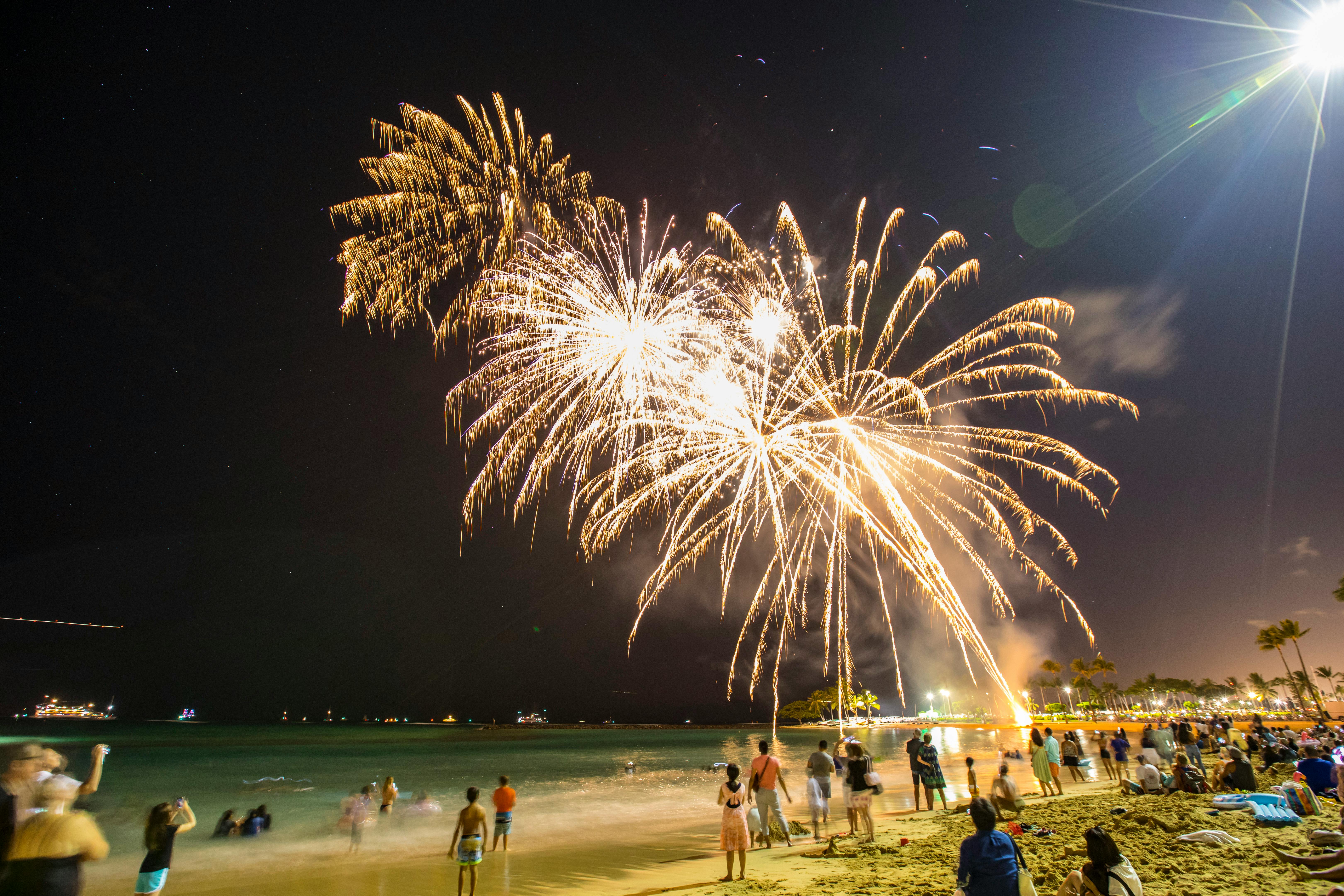 Vibrant Beach Fireworks Display at Night · Free Stock Photo