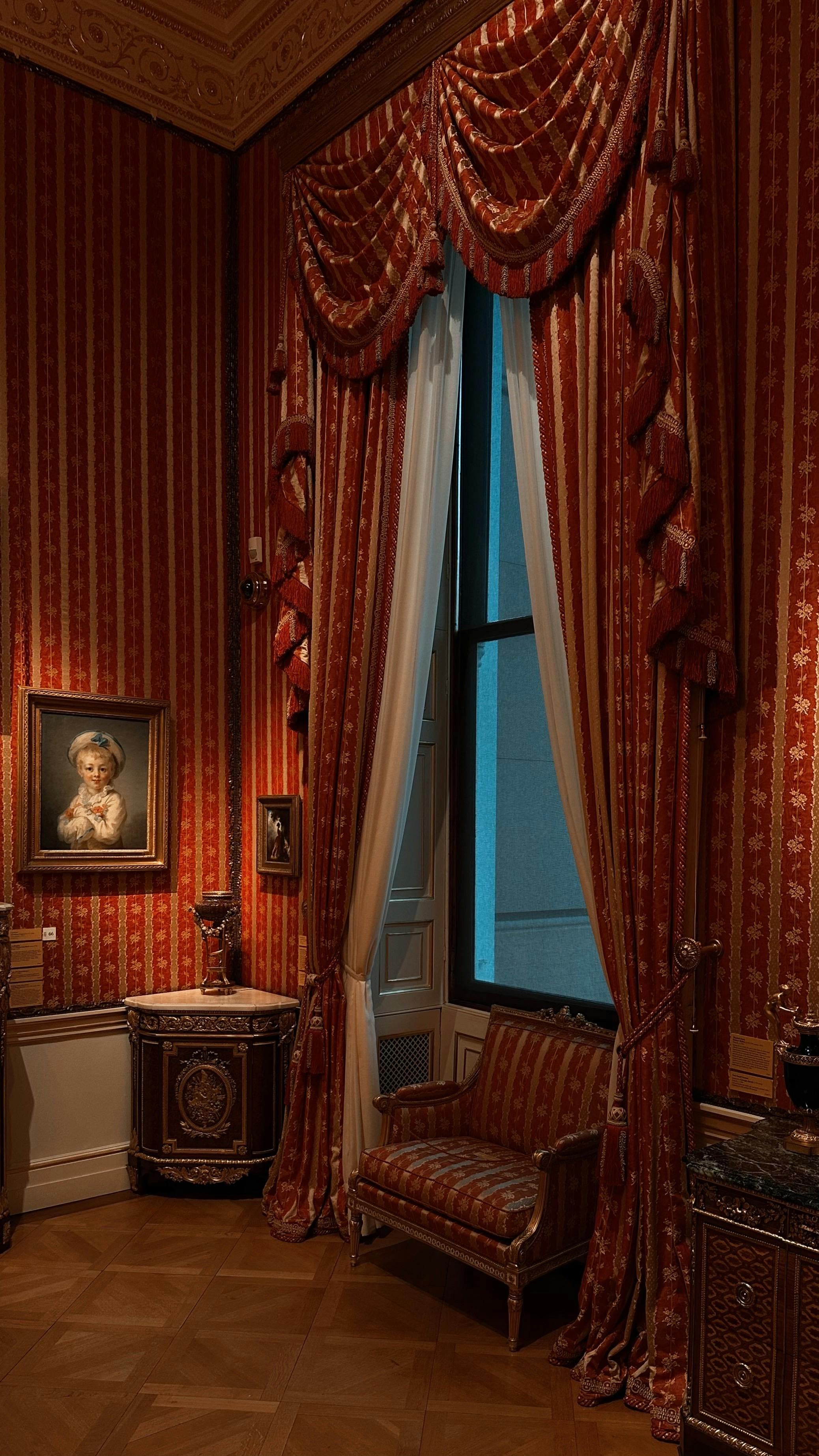 Elegant Victorian Room with Red Curtains in London · Free Stock Photo