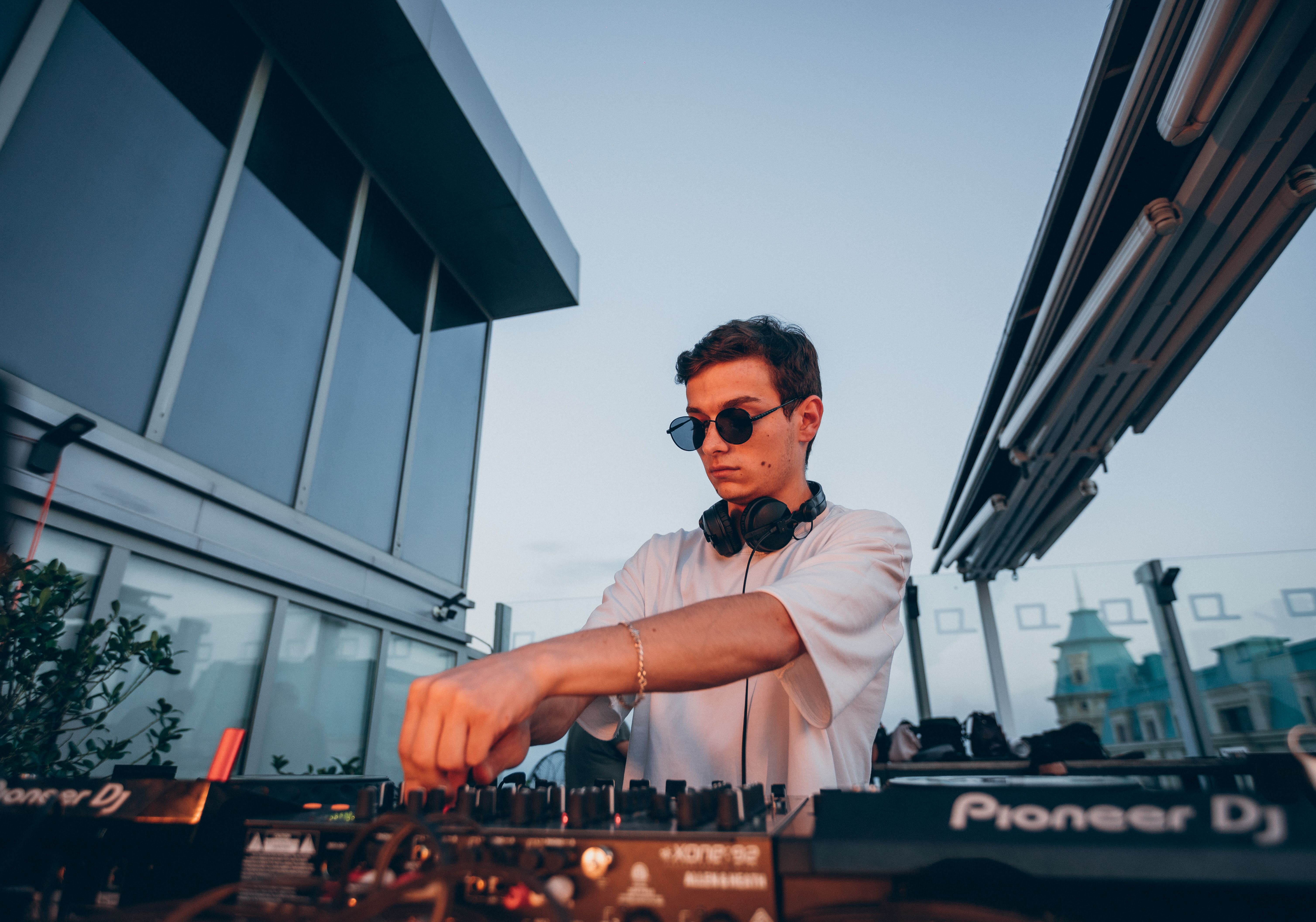 DJ Performing at Rooftop Party During Daytime · Free Stock Photo