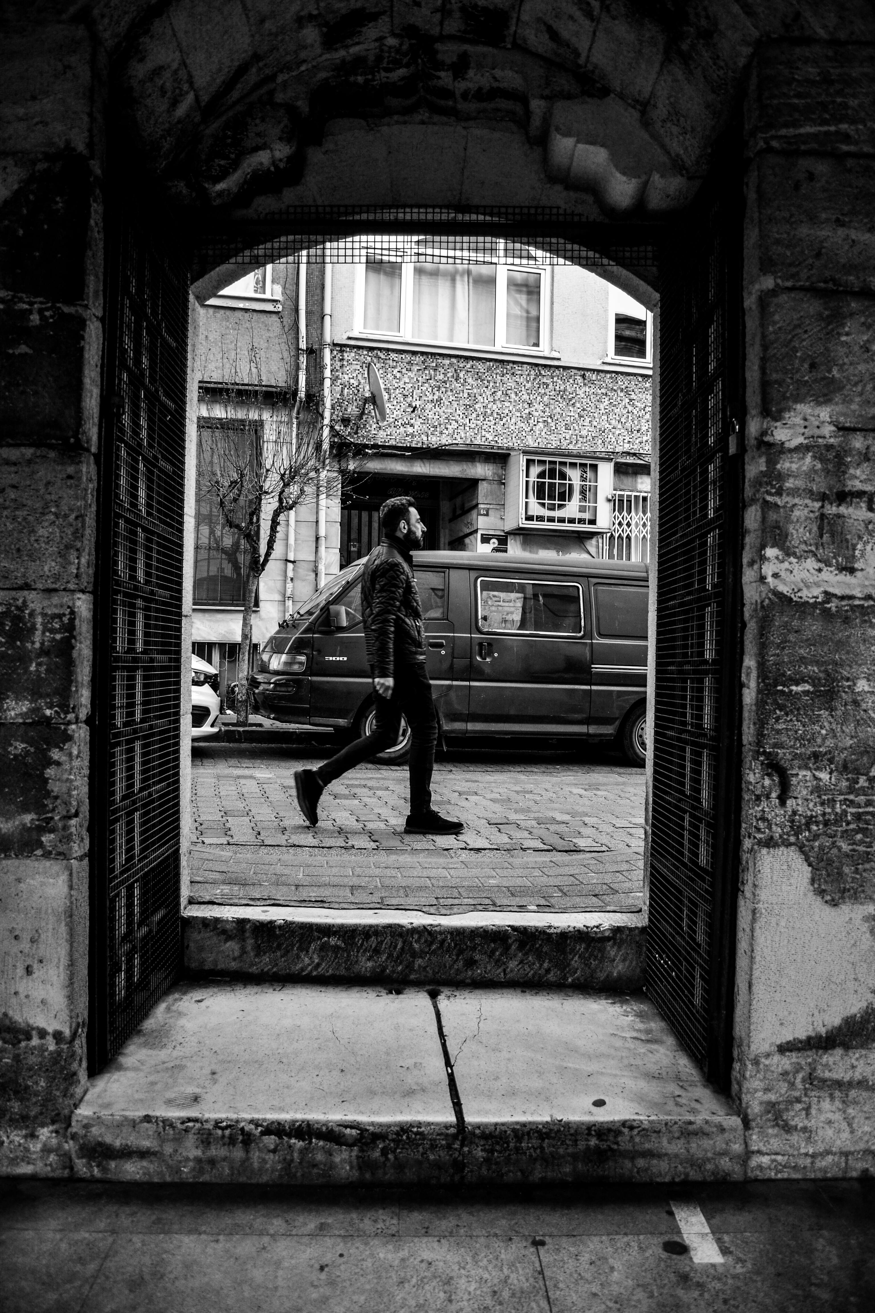 Black and White Urban Archway Scene · Free Stock Photo