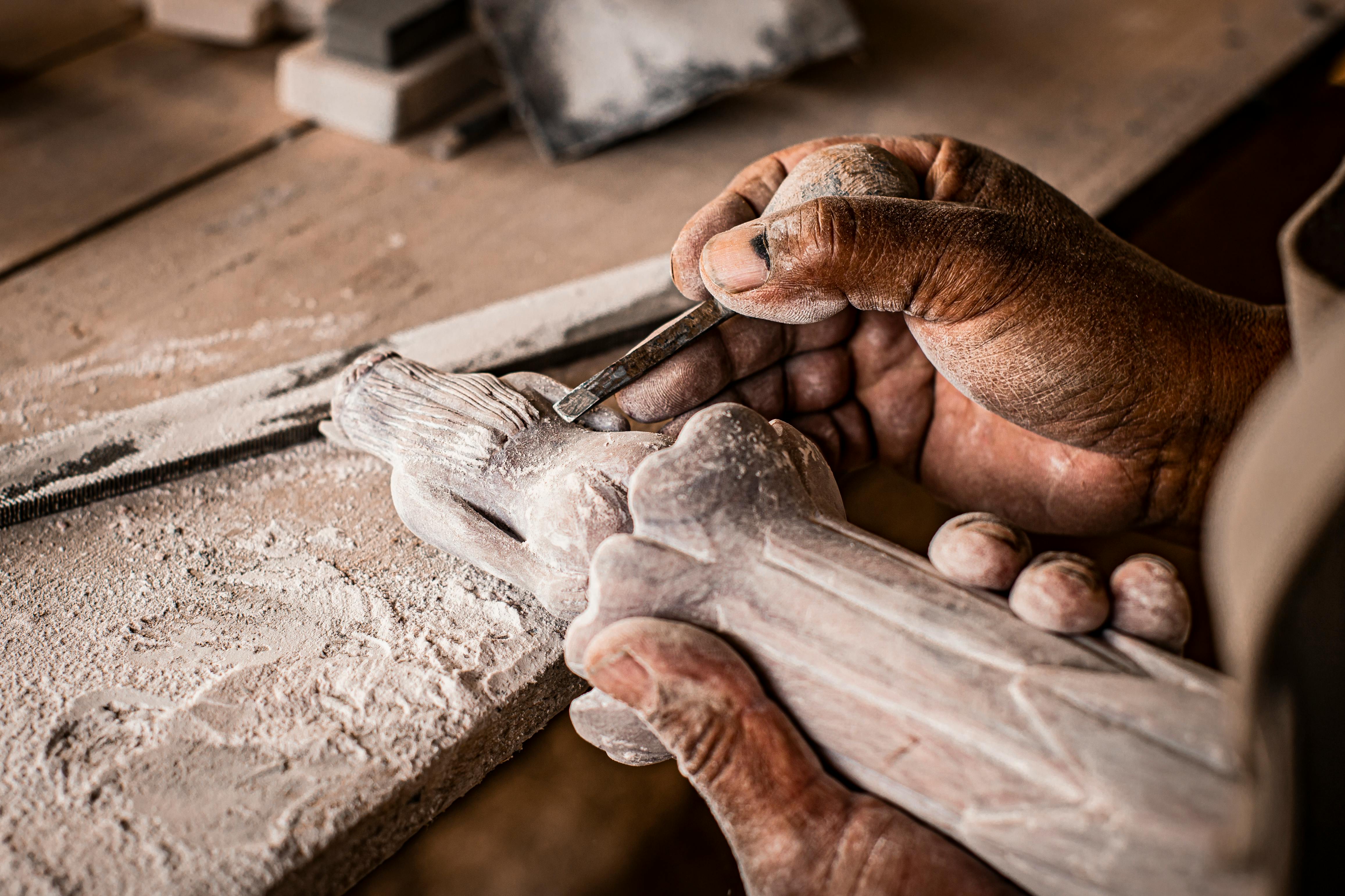 Artisan Hand Carving Stone Sculpture in Cusco · Free Stock Photo