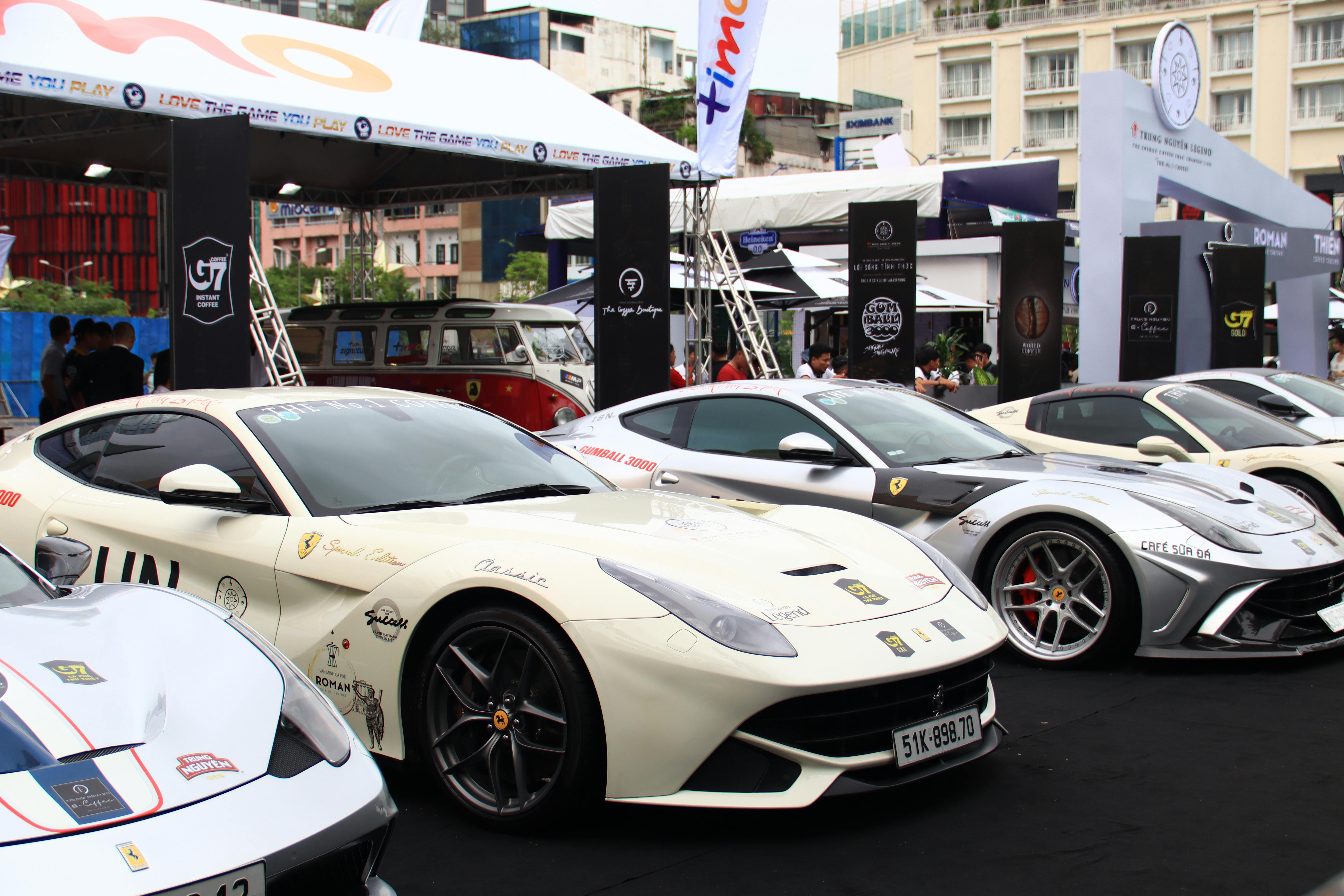 Luxury Sports Cars Display at Motor Show · Free Stock Photo