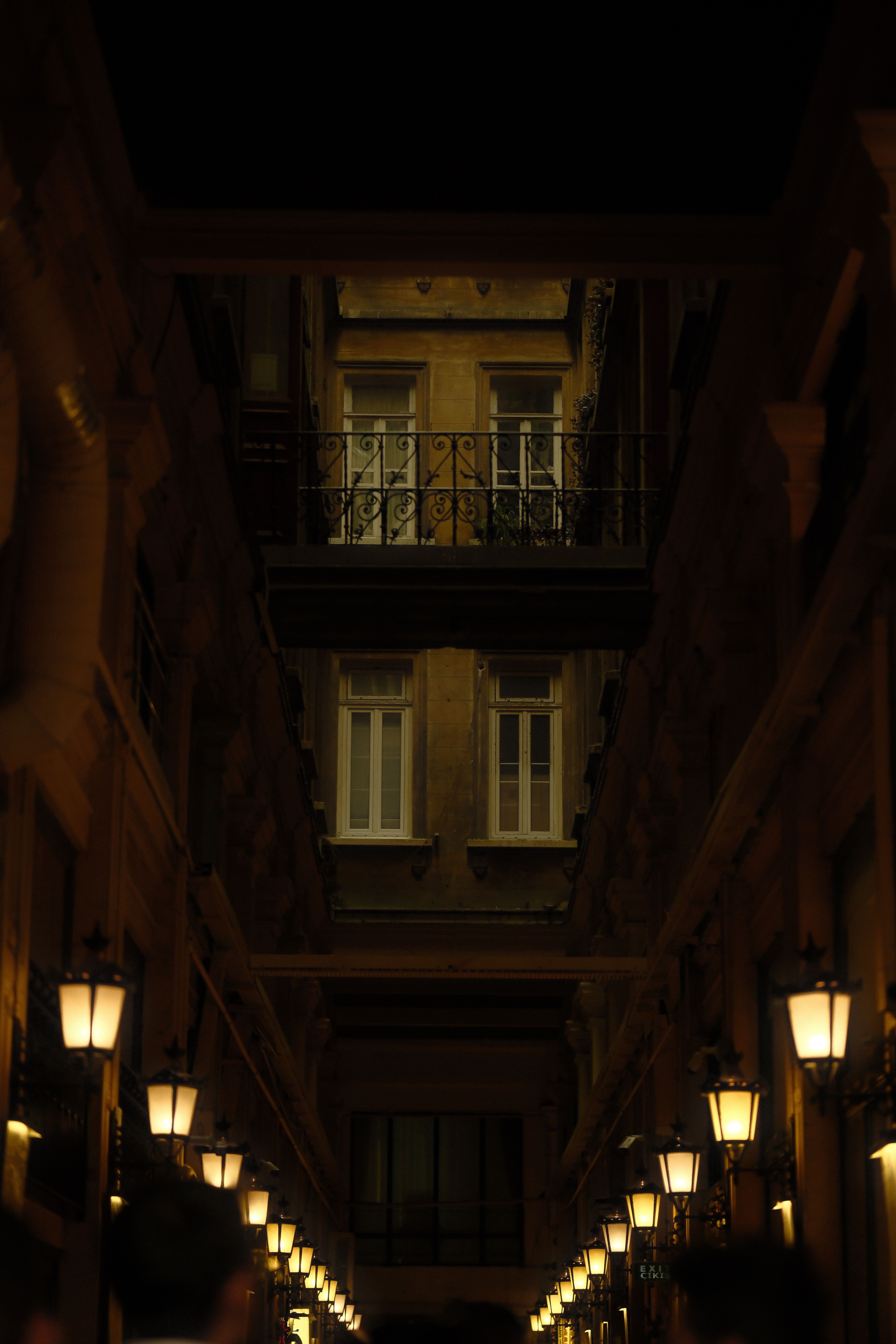 Dimly Lit Architectural Passage at Night · Free Stock Photo
