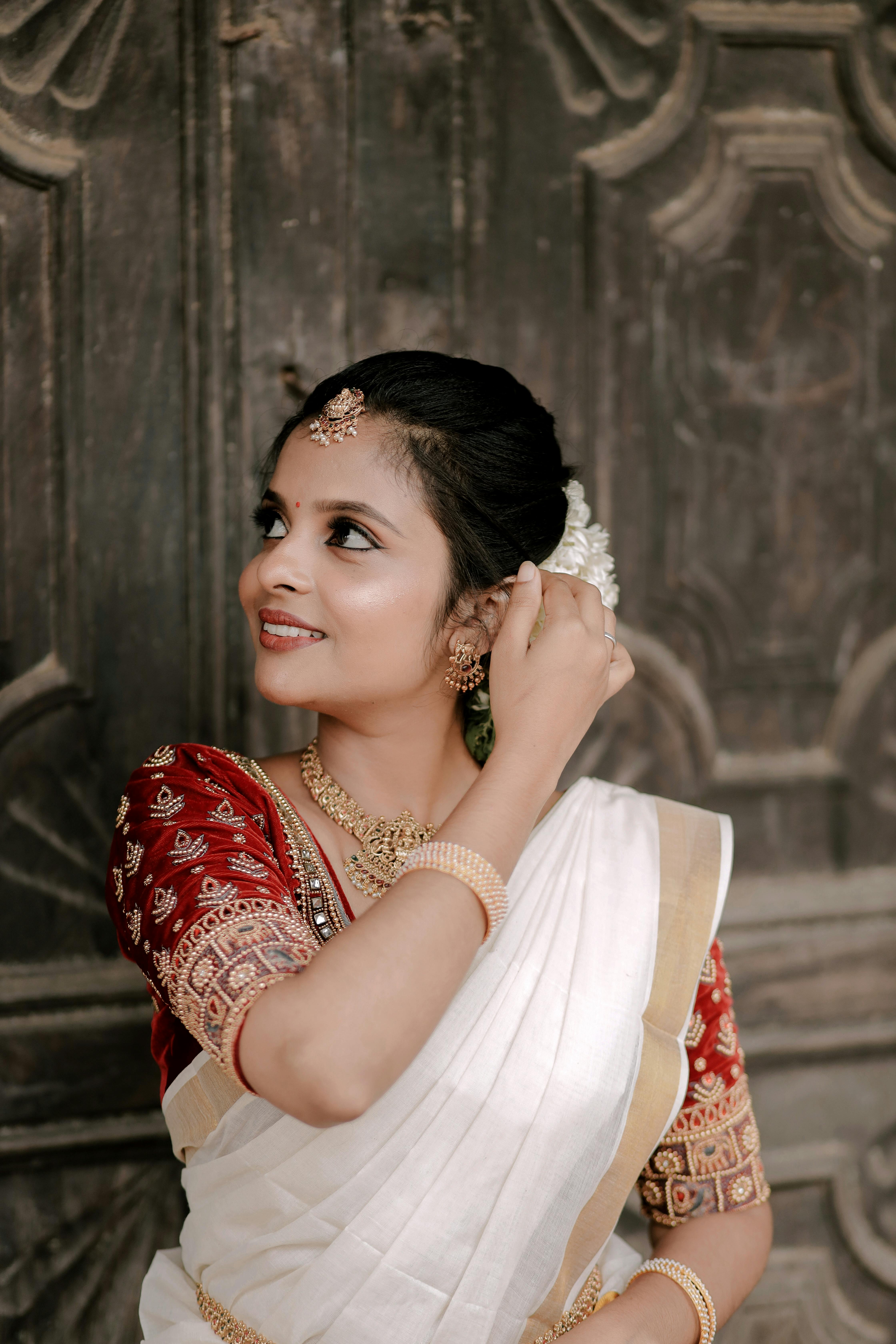 Elegant Indian Woman in Traditional Attire · Free Stock Photo