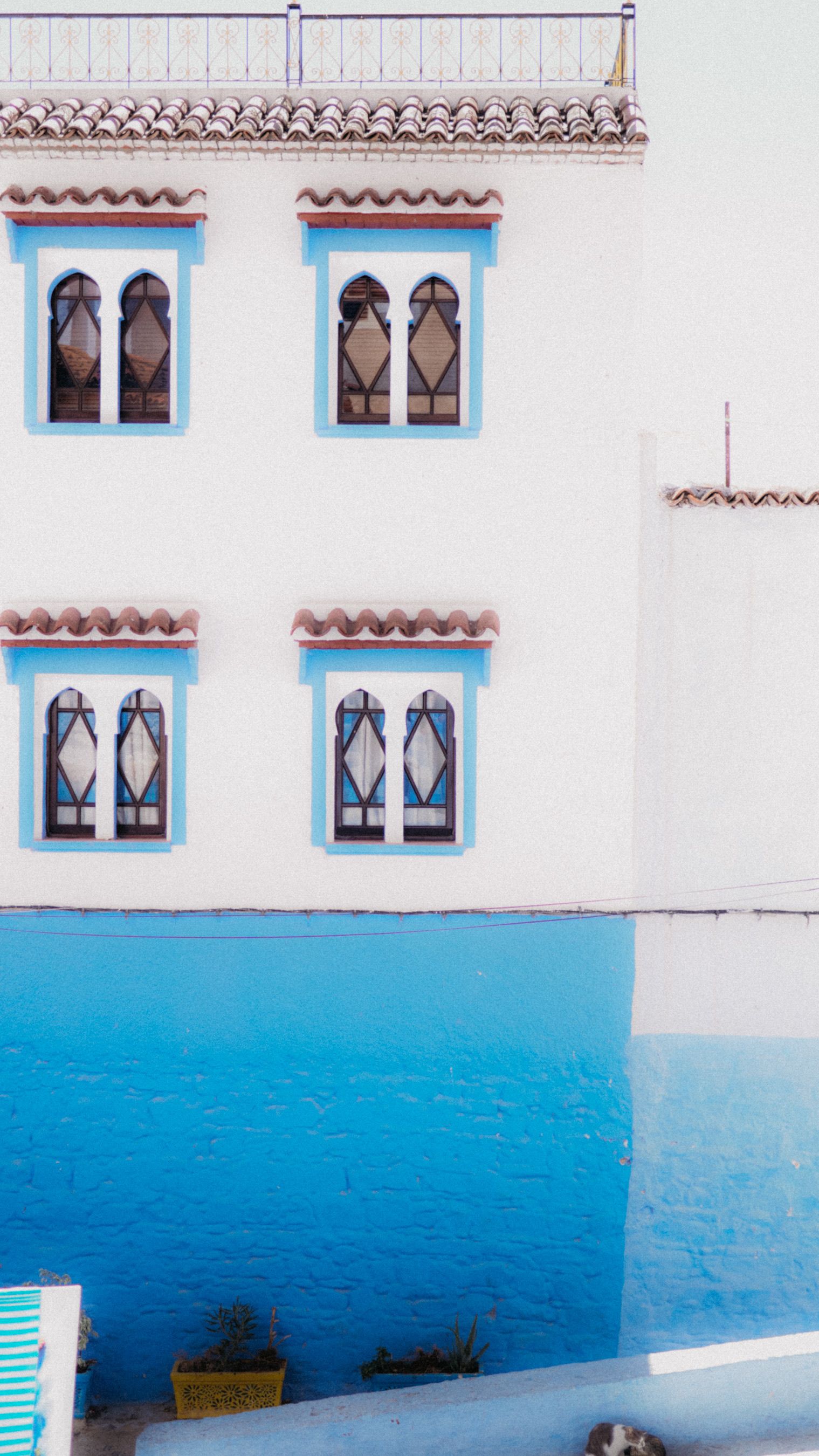 Traditional Mediterranean Architecture with Blue Facade · Free Stock Photo