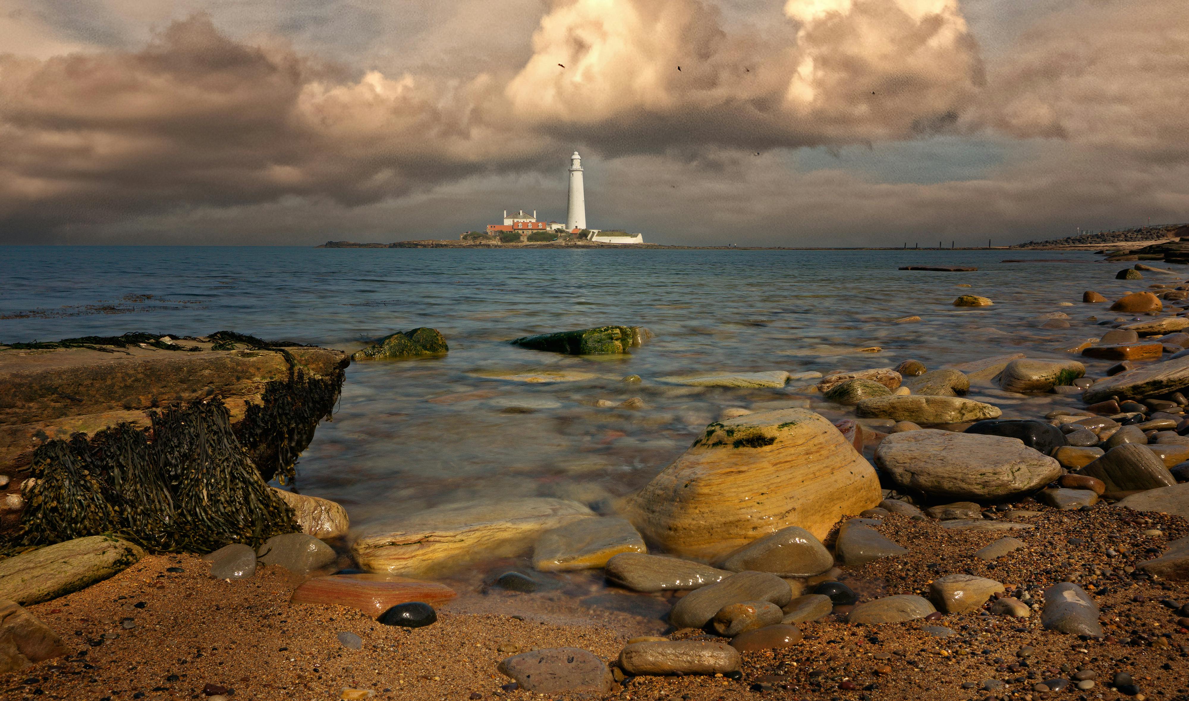 Photo Of Lighthouse On Seaside During Daytime · Free Stock Photo