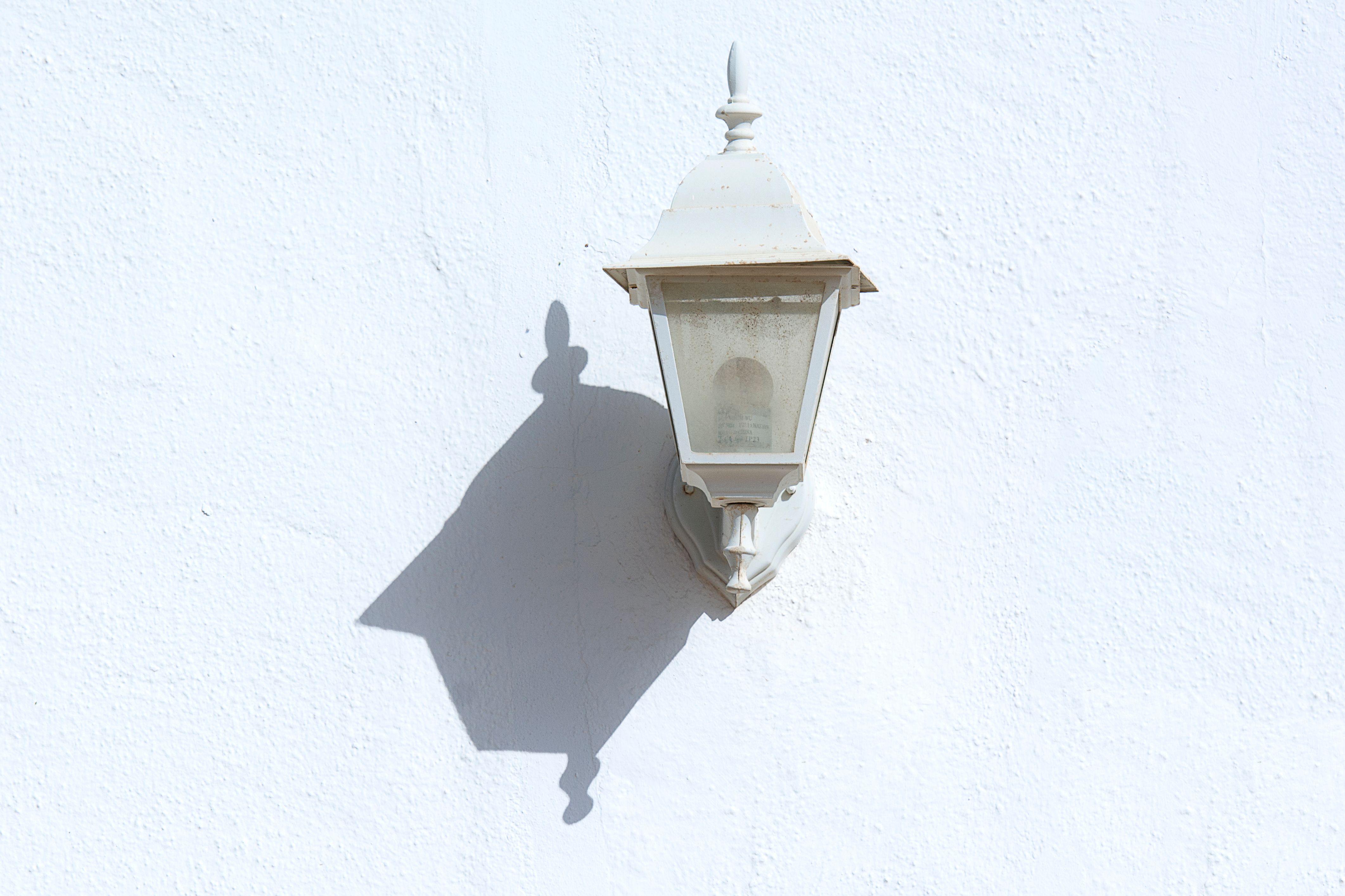 Decorative White Wall Lamp with Shadow · Free Stock Photo