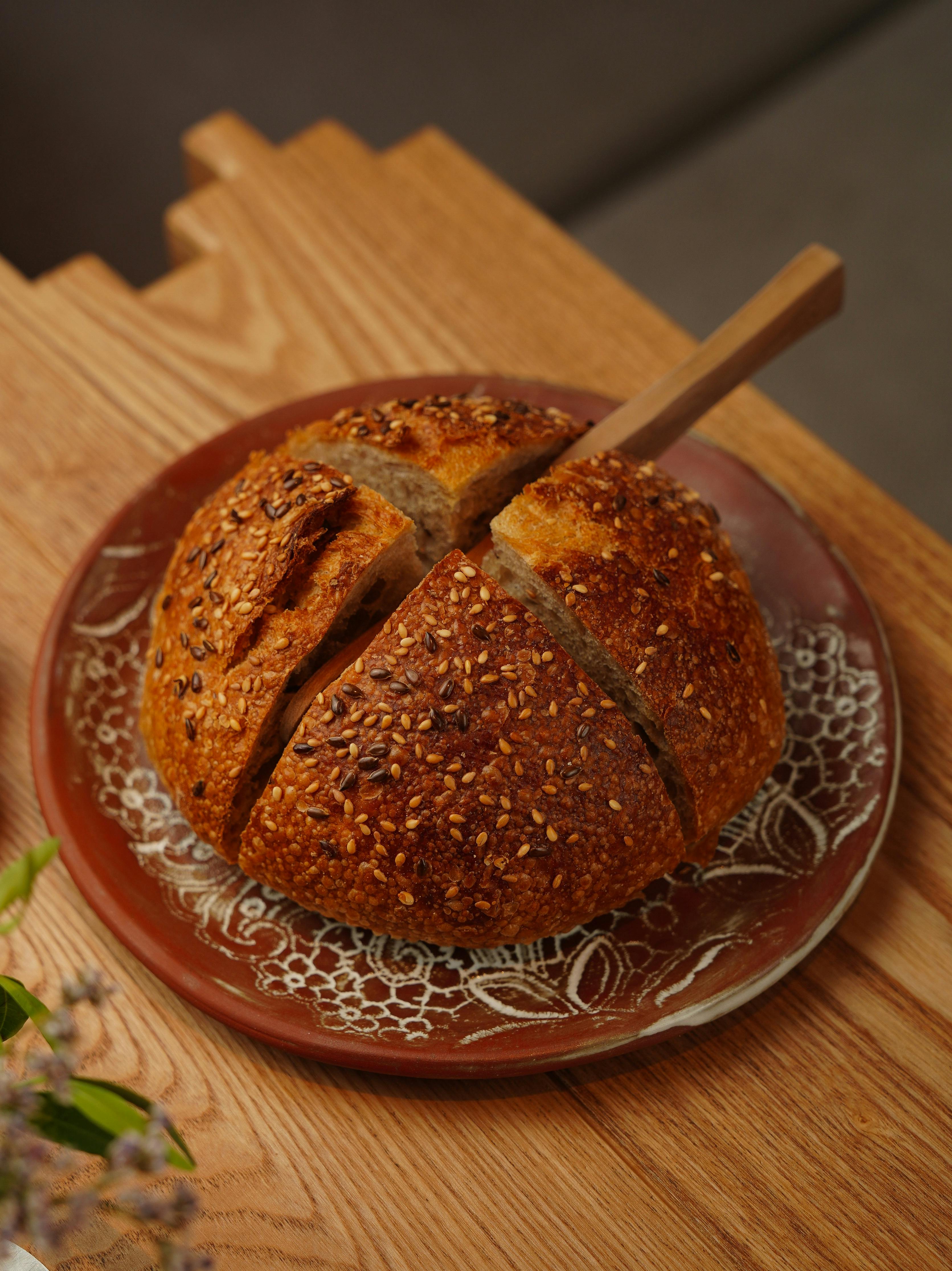 Rustic Artisan Bread on Decorative Plate · Free Stock Photo