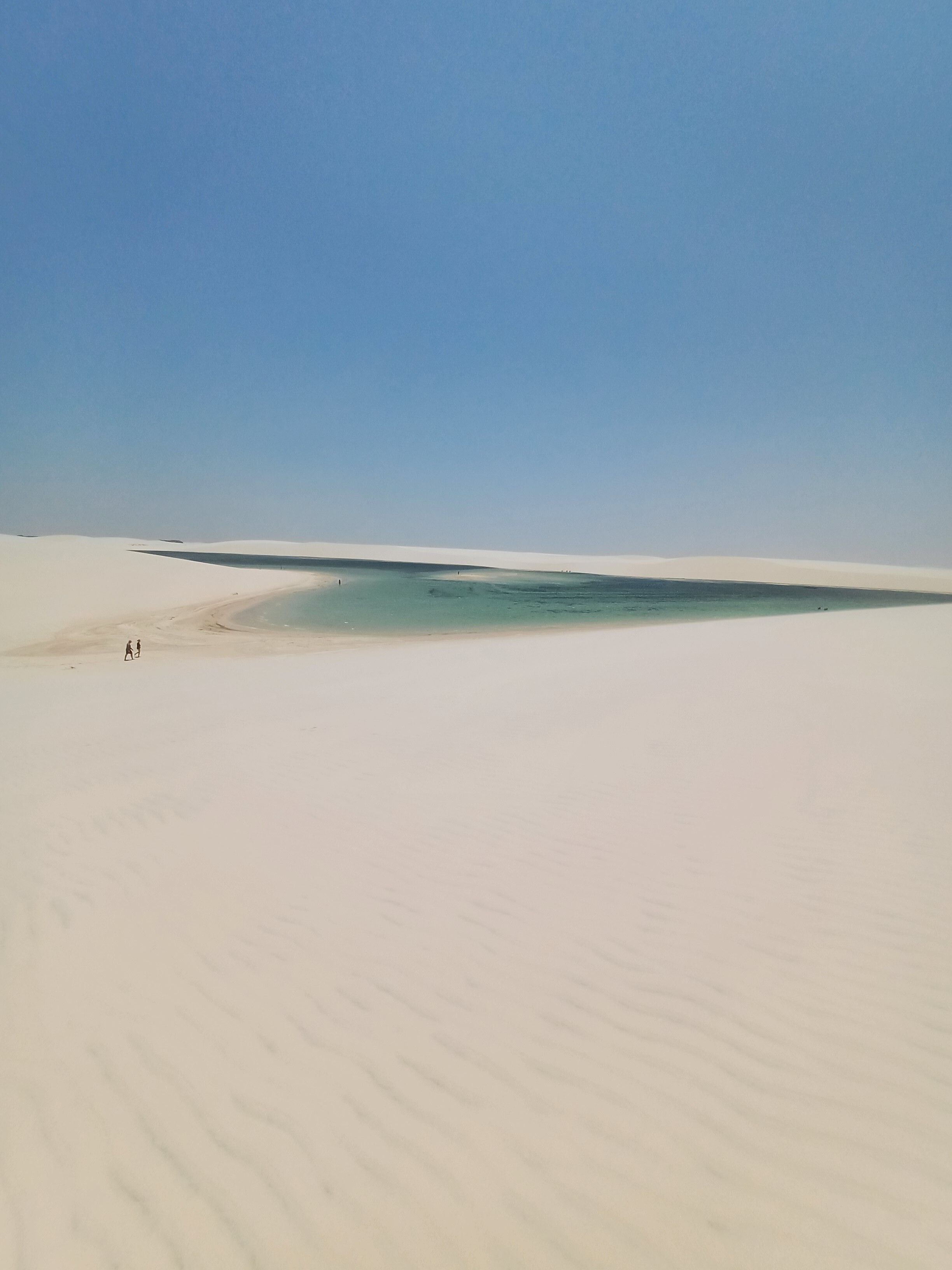 Stunning Sand Dunes with Blue Lagoon · Free Stock Photo