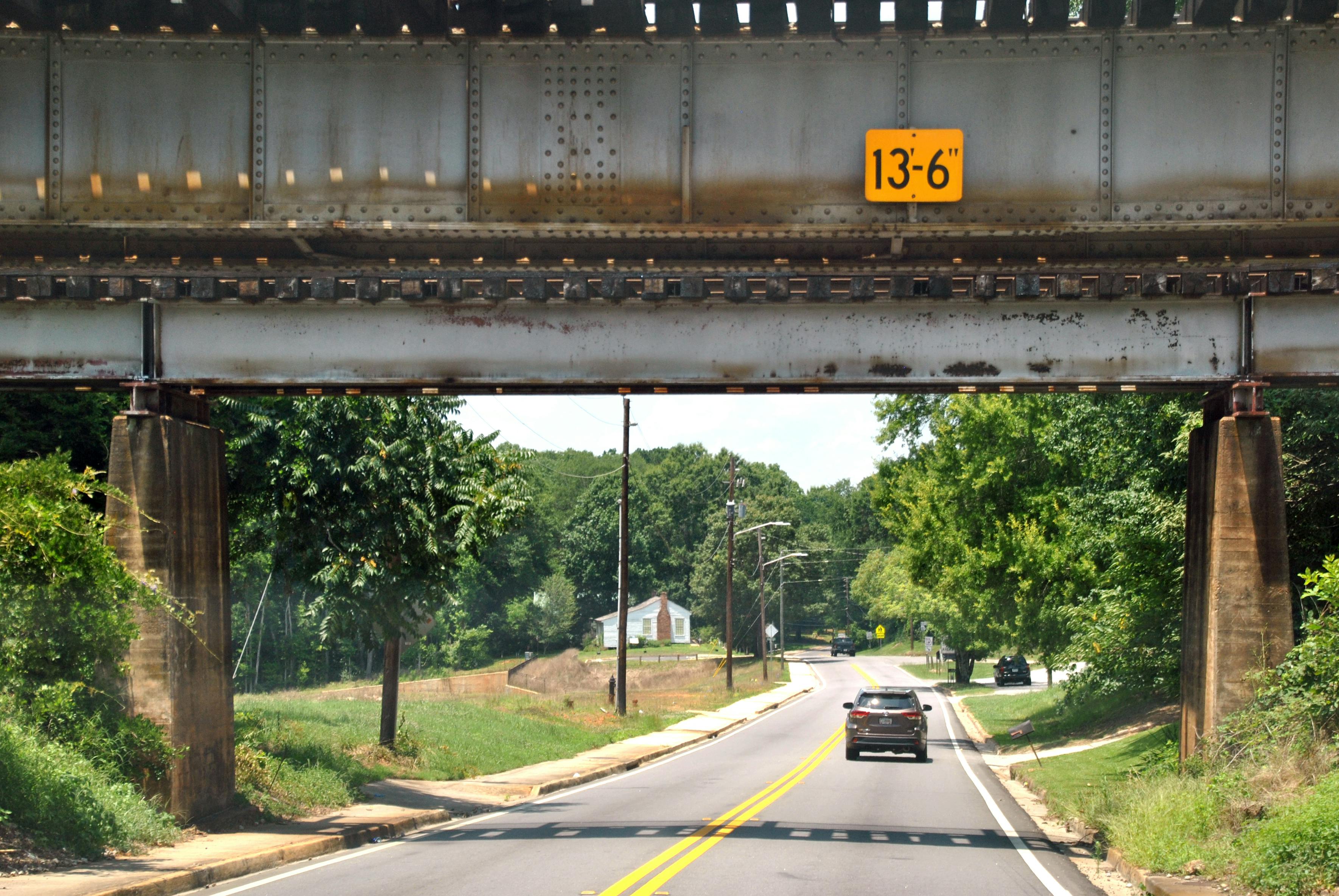 Road Underpass with Height Restriction Sign · Free Stock Photo