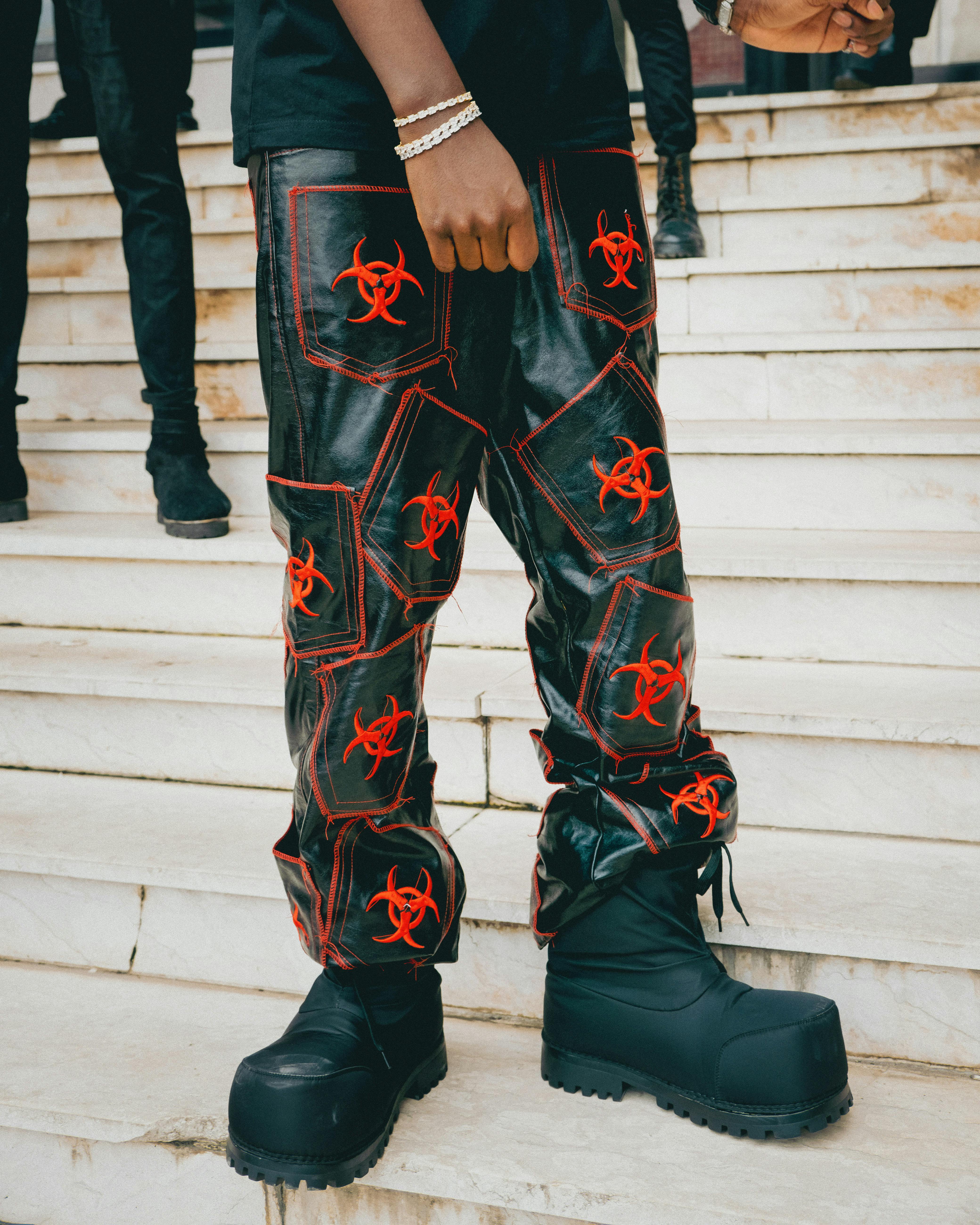 Fashionable Leather Pants with Biohazard Designs · Free Stock Photo