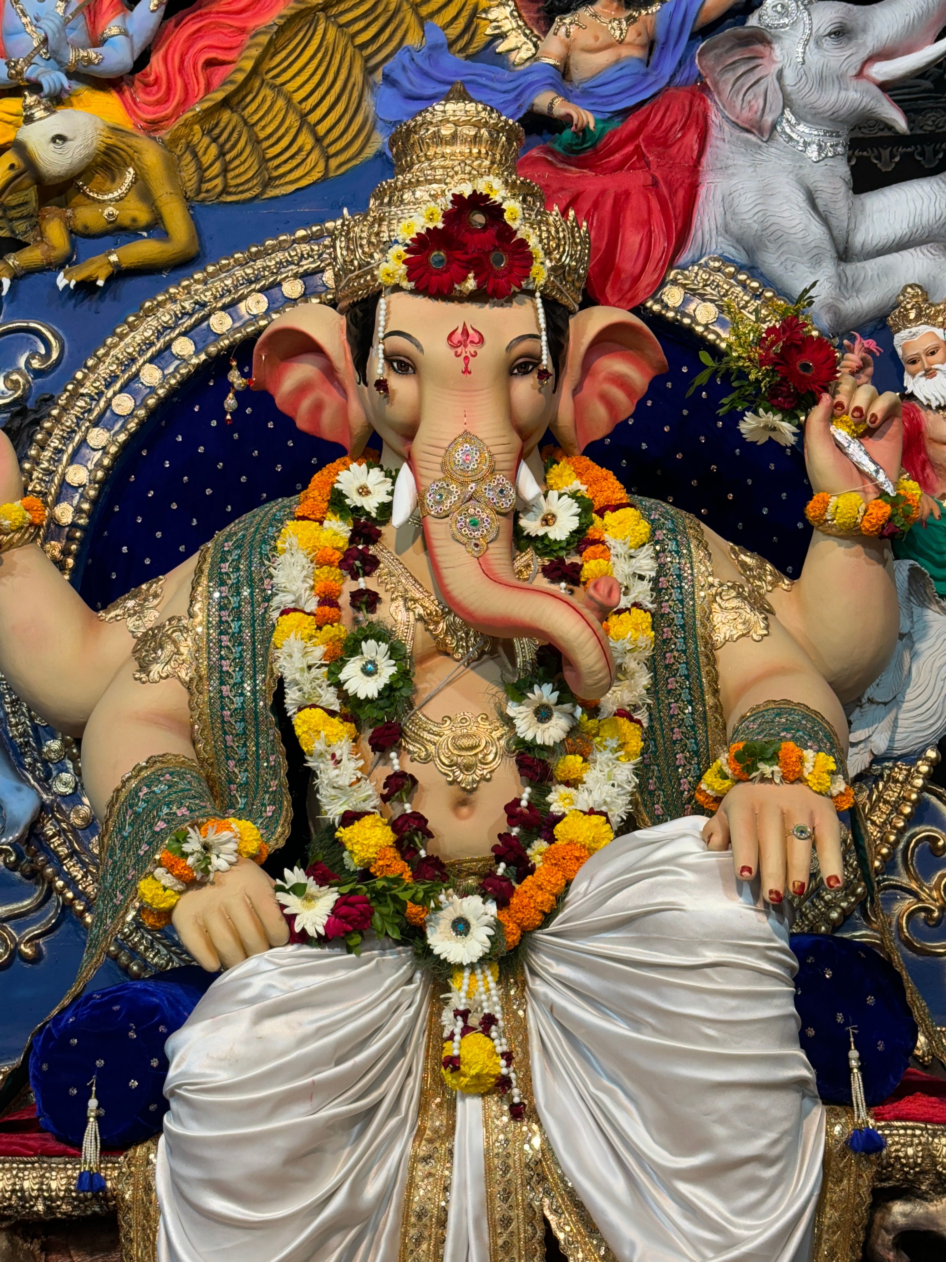 Figure of Hindu God in Yellow Dress · Free Stock Photo