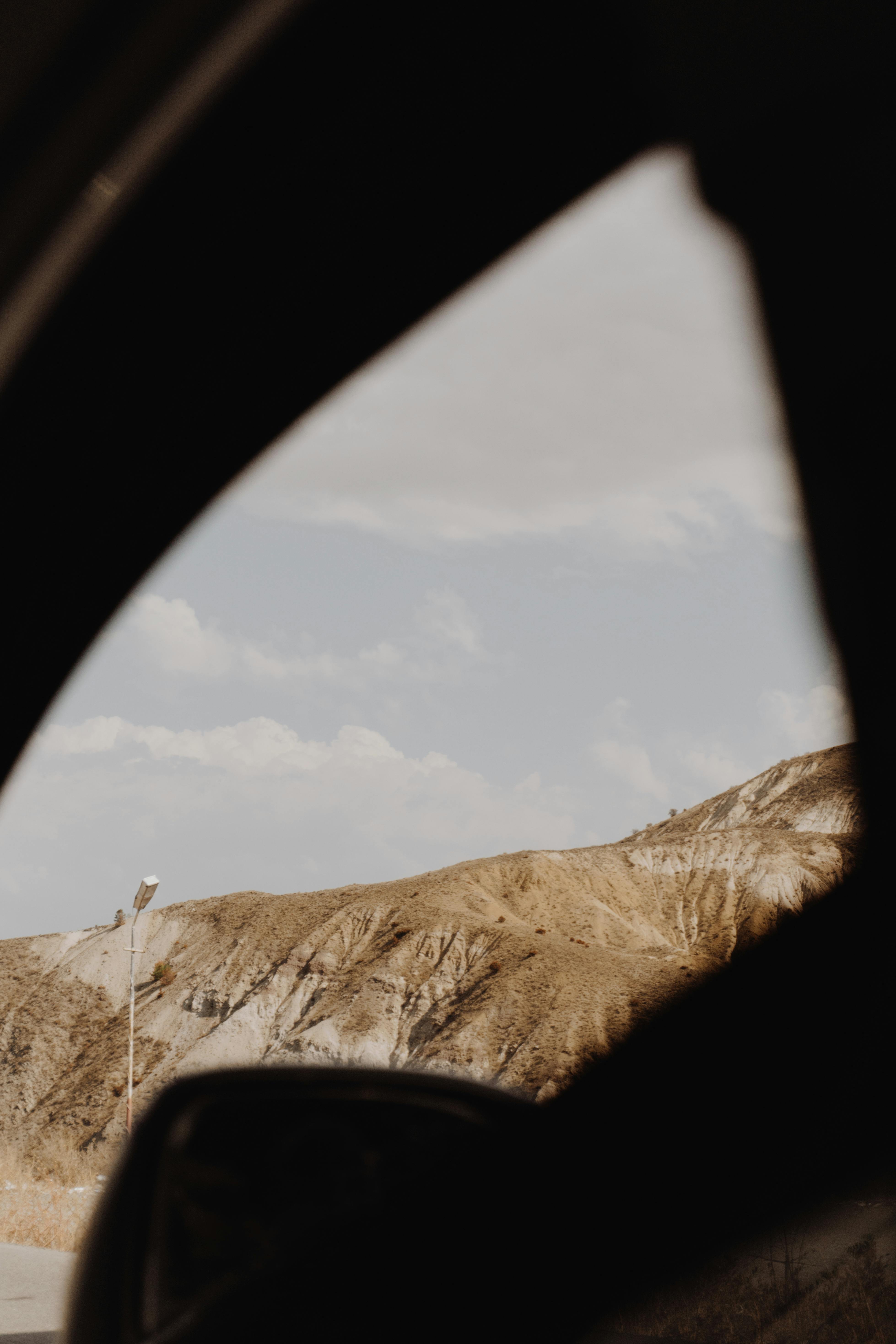 Framed Desert Landscape Through Car Window · Free Stock Photo