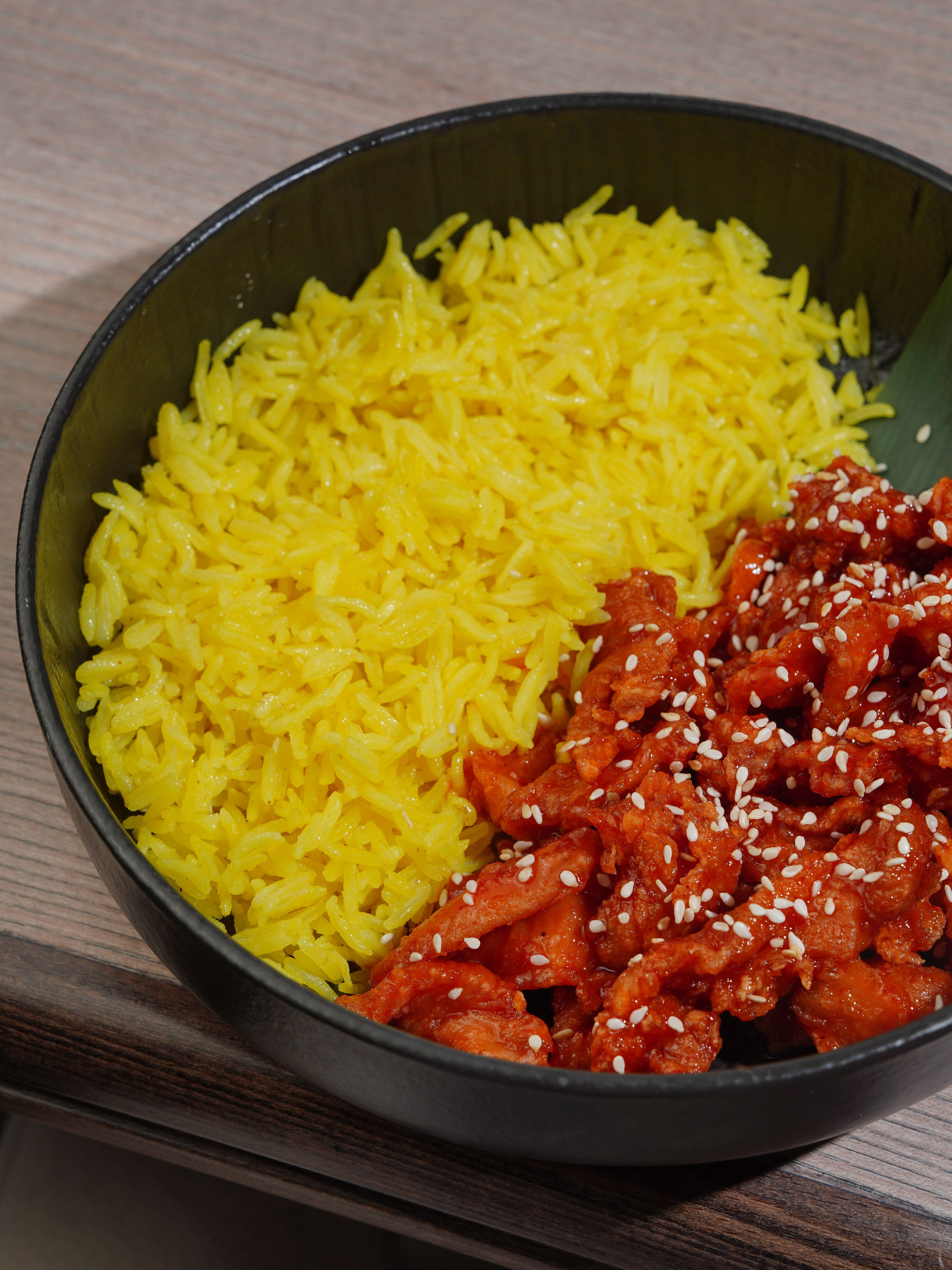 Delicious Yellow Rice and Spicy Meat Bowl · Free Stock Photo