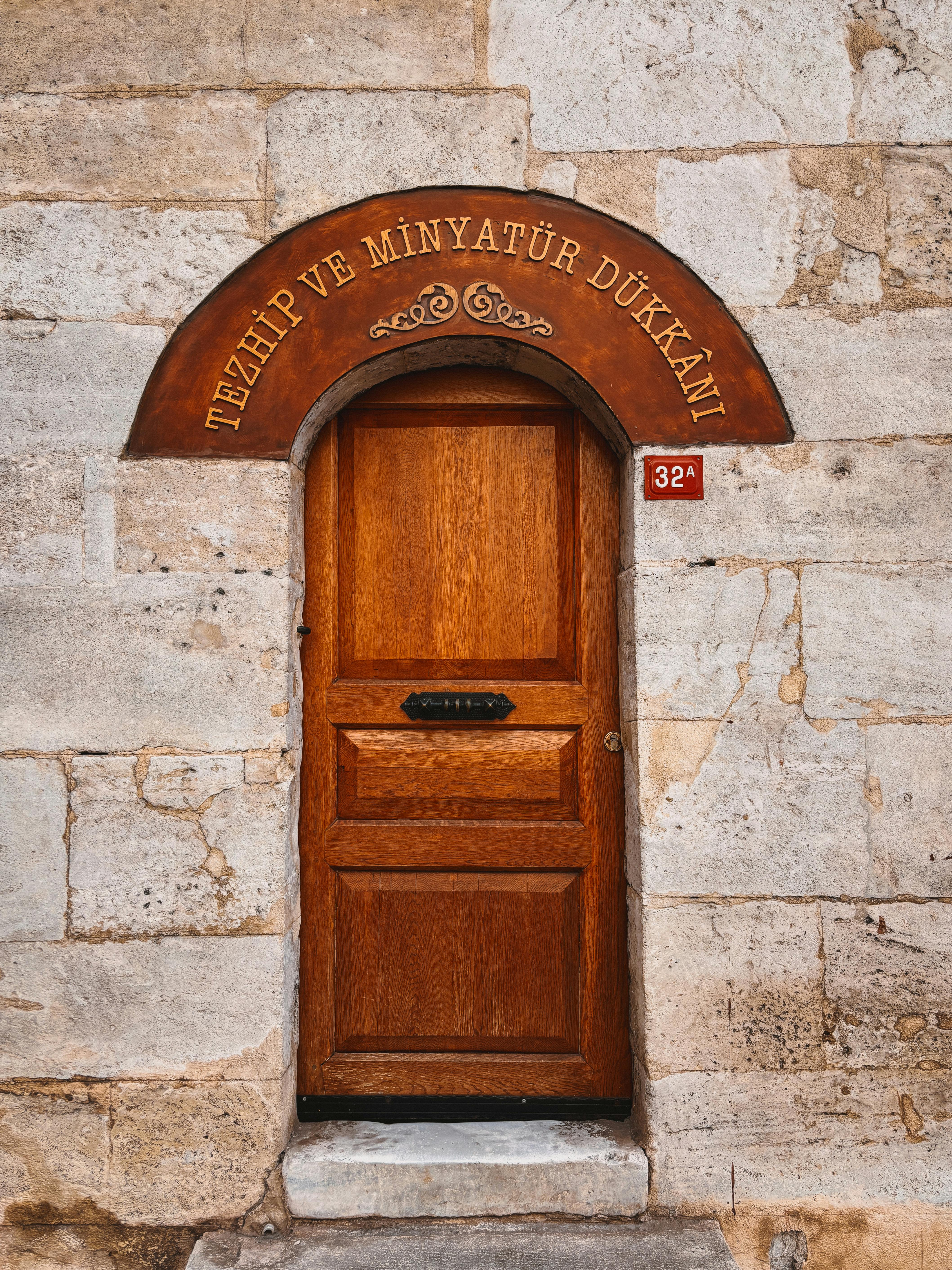 Historic Wooden Door with Turkish Signage · Free Stock Photo