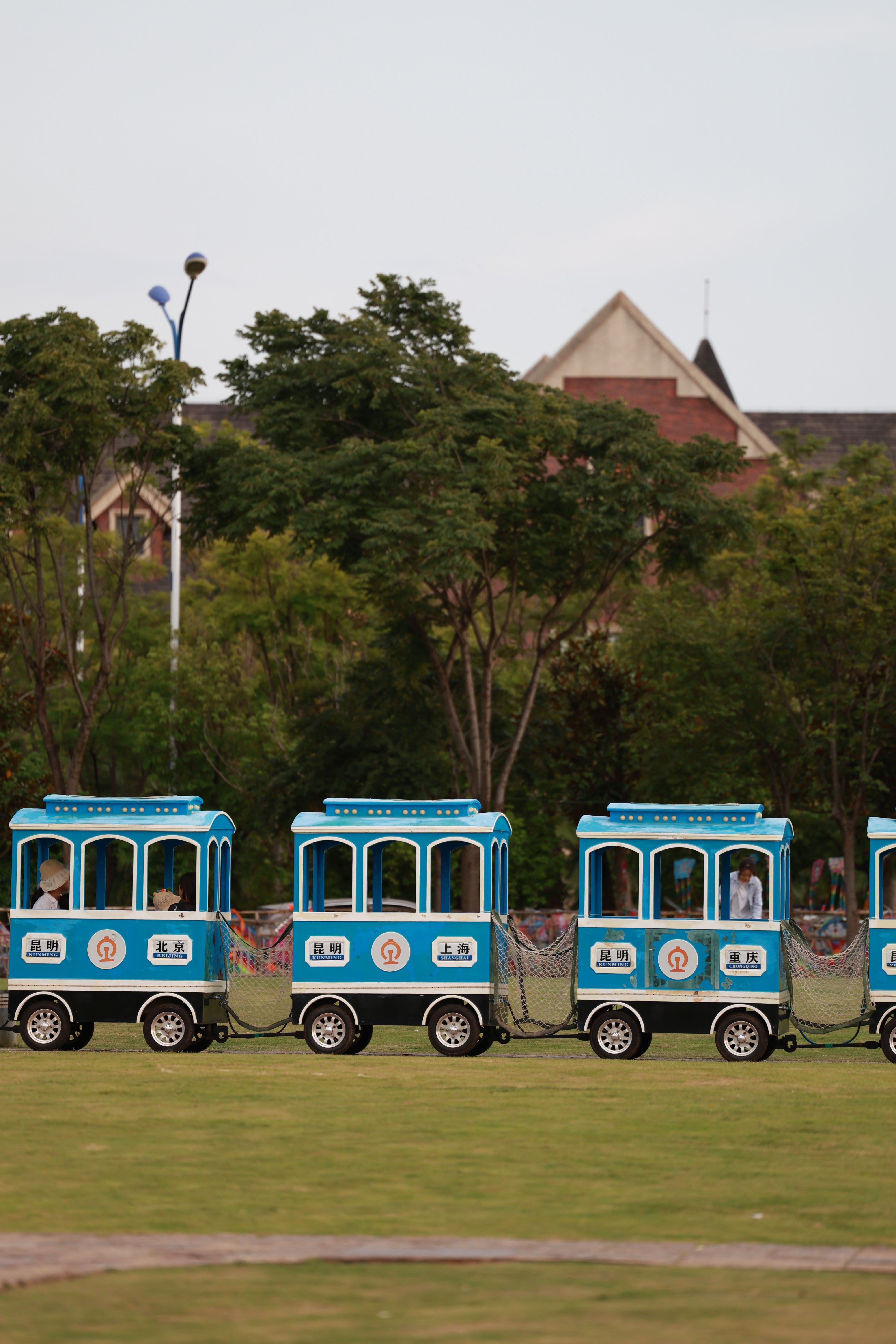 Colorful Miniature Train in a Park Setting · Free Stock Photo