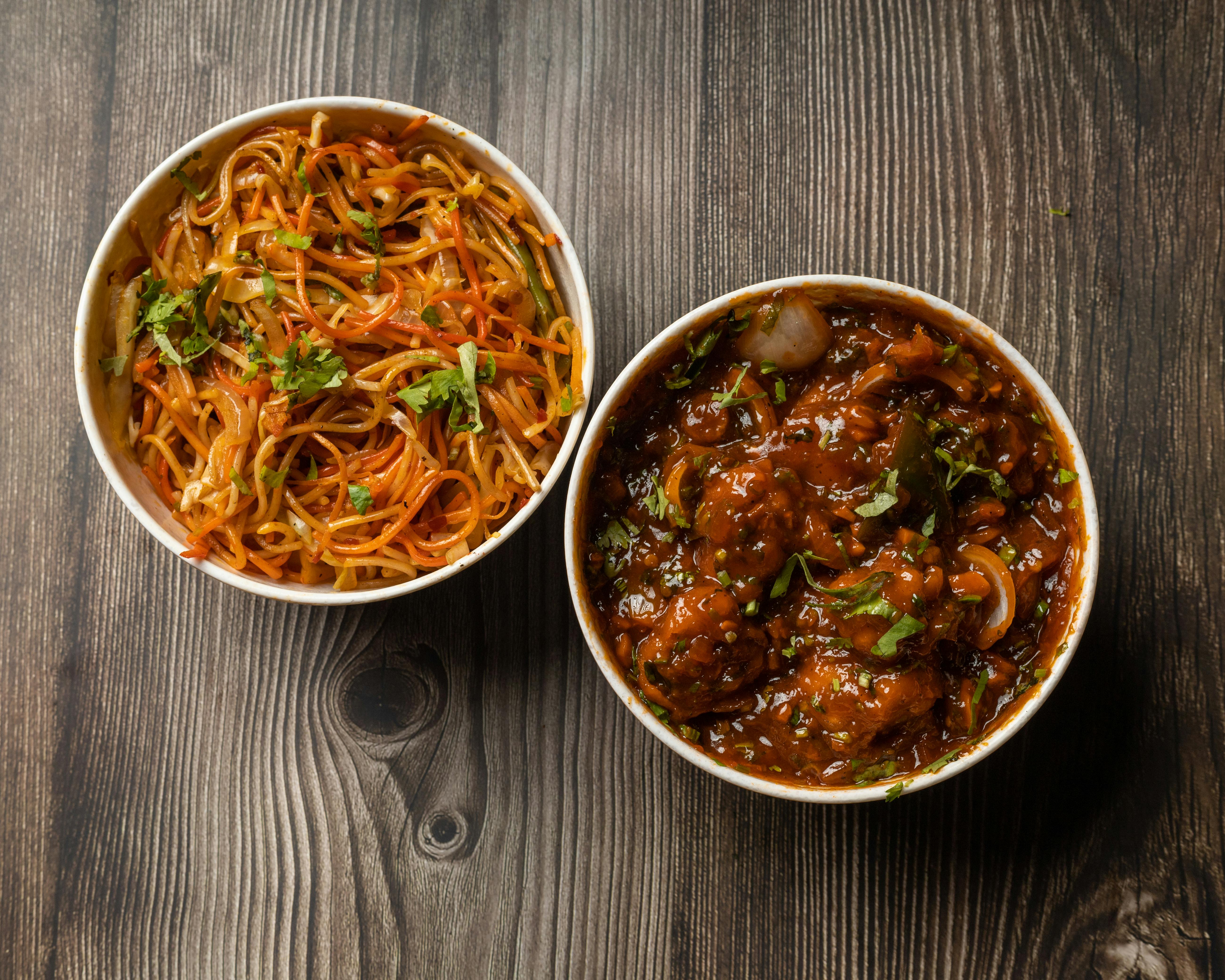 Delicious Indo-Chinese Noodles and Manchurian · Free Stock Photo