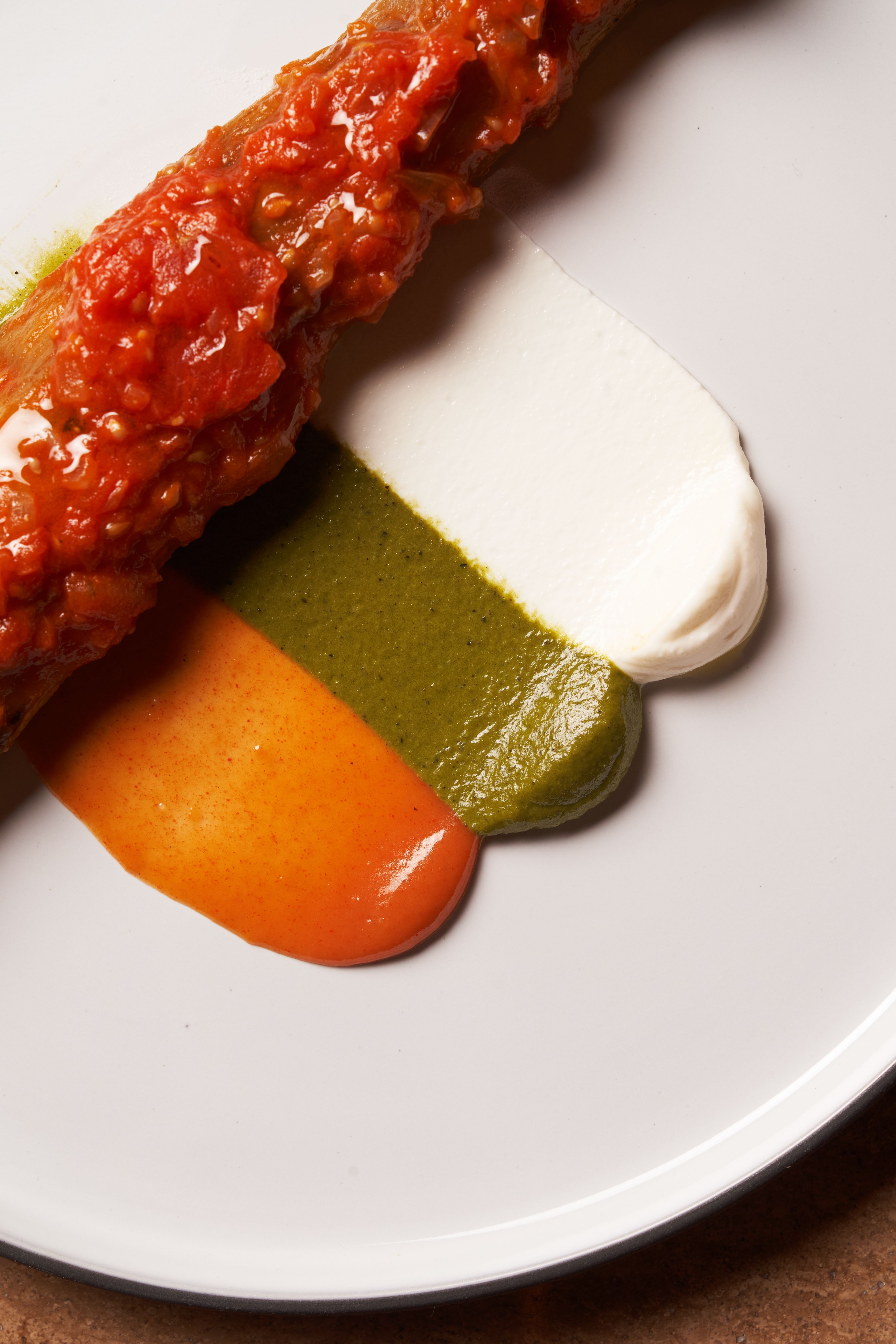 Gourmet Plated Sauces and Stuffed Pepper · Free Stock Photo