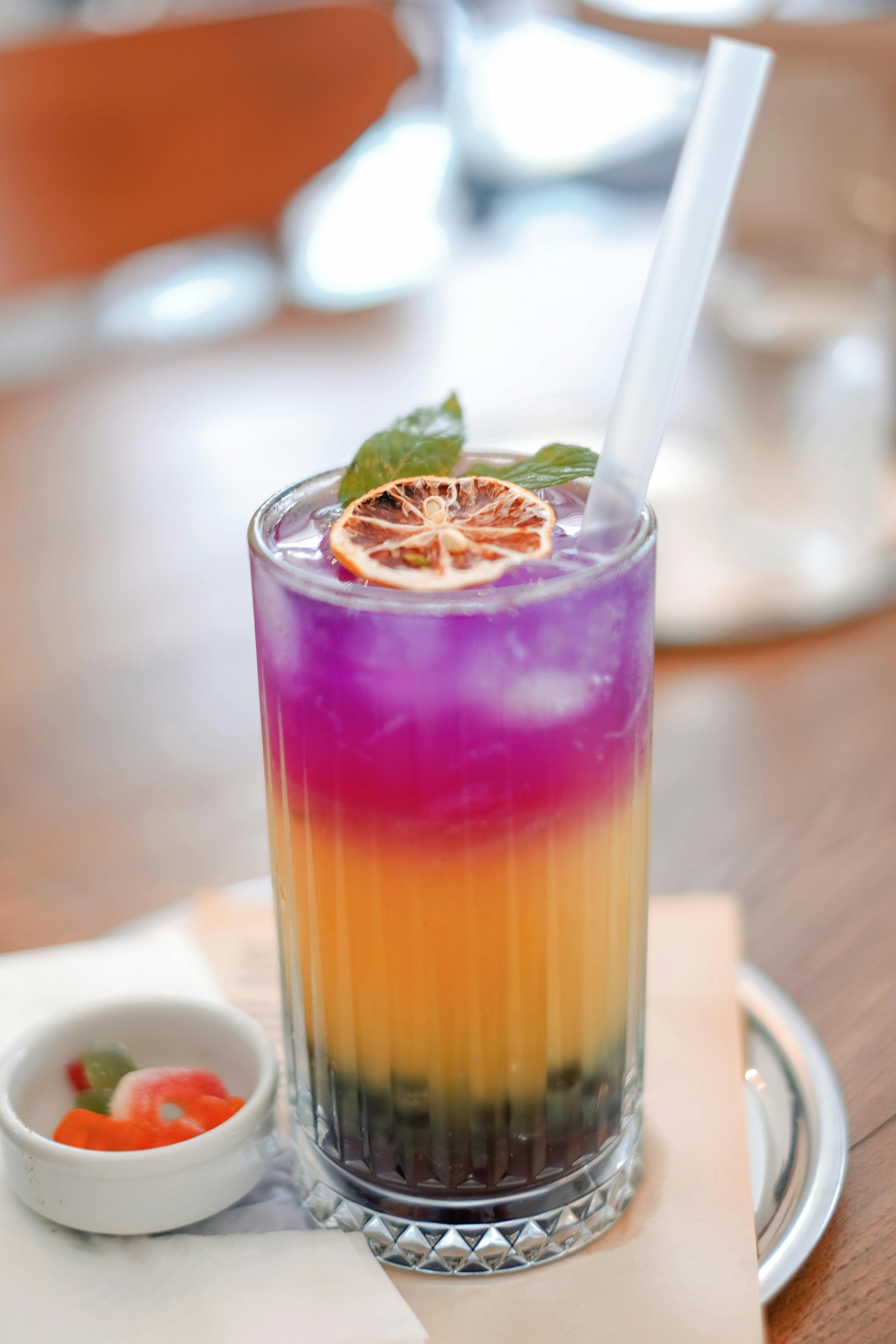 Vibrant Layered Mocktail with Citrus and Mint · Free Stock Photo