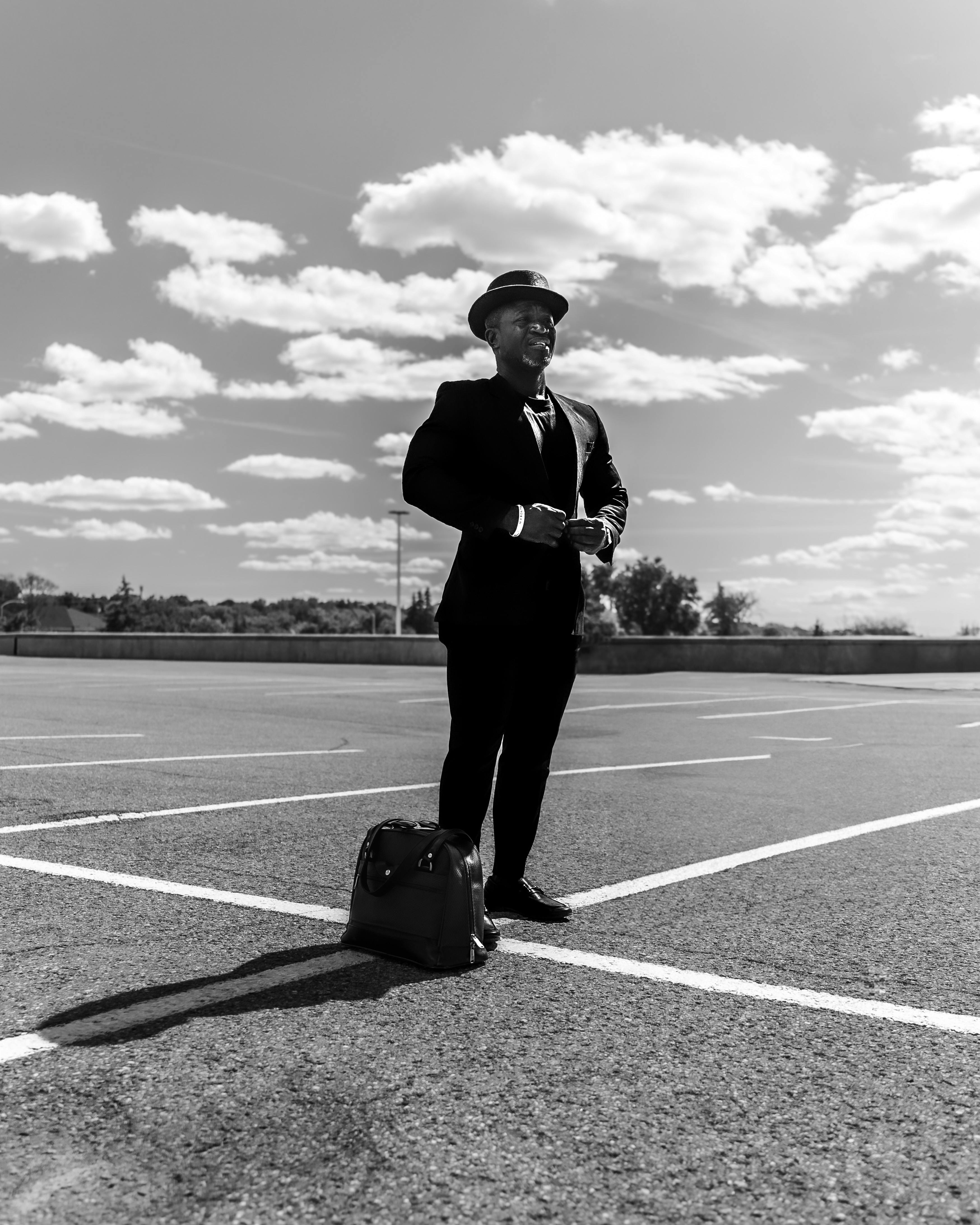 Man Leaning on Post · Free Stock Photo