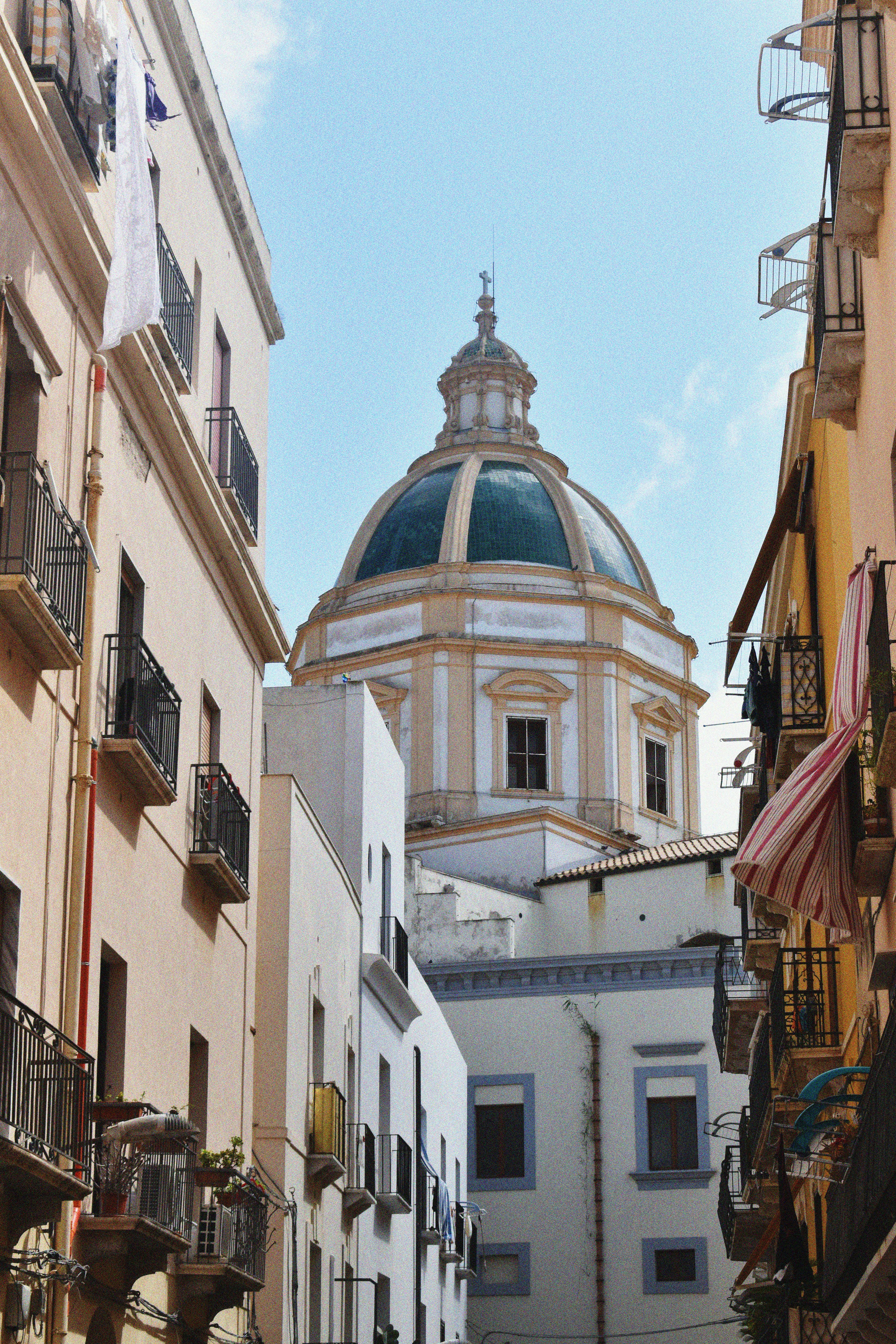 Scenic View of Historic Dome in European Alleyway · Free Stock Photo