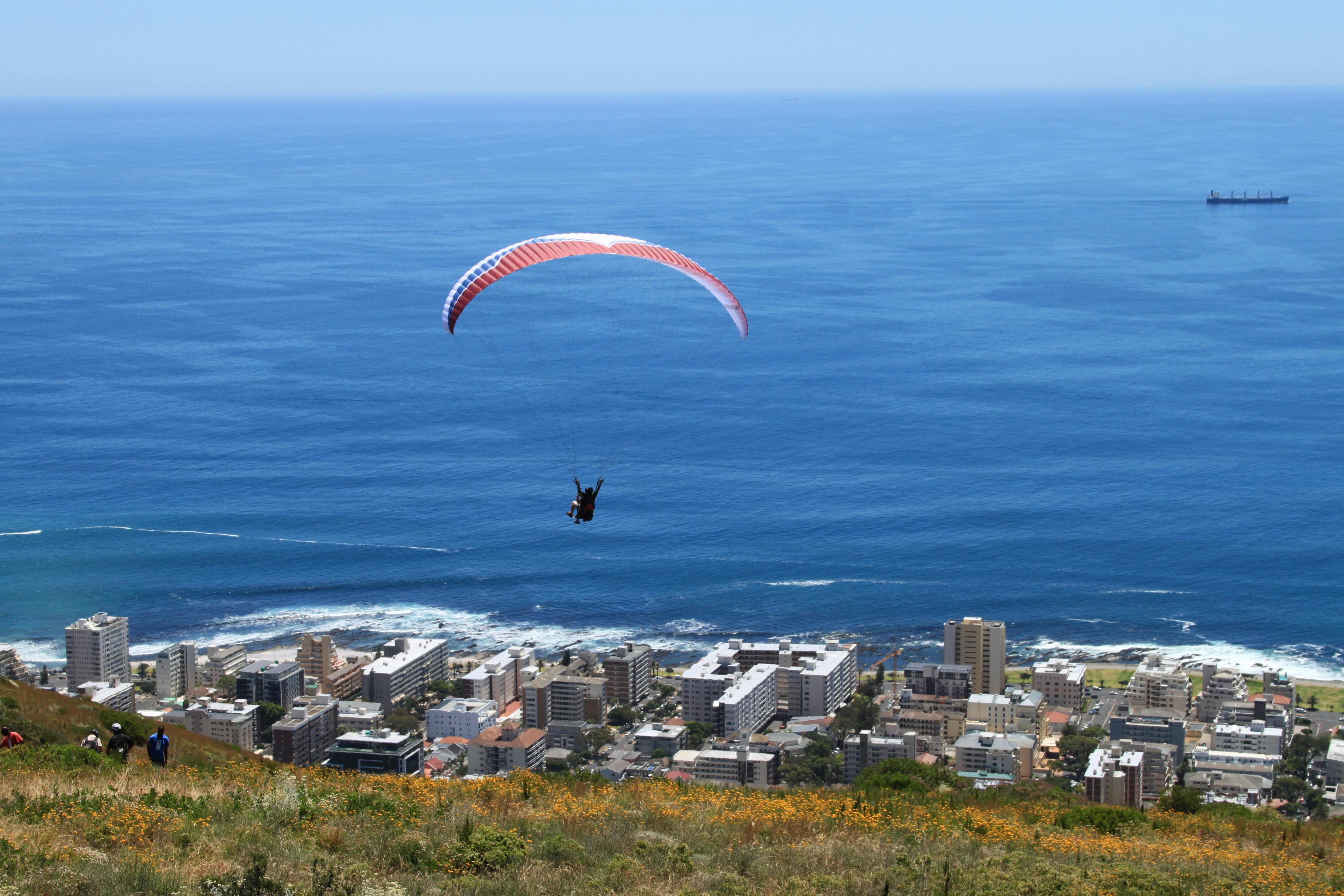Paraglider Over Cape Town's Scenic Coastline · Free Stock Photo