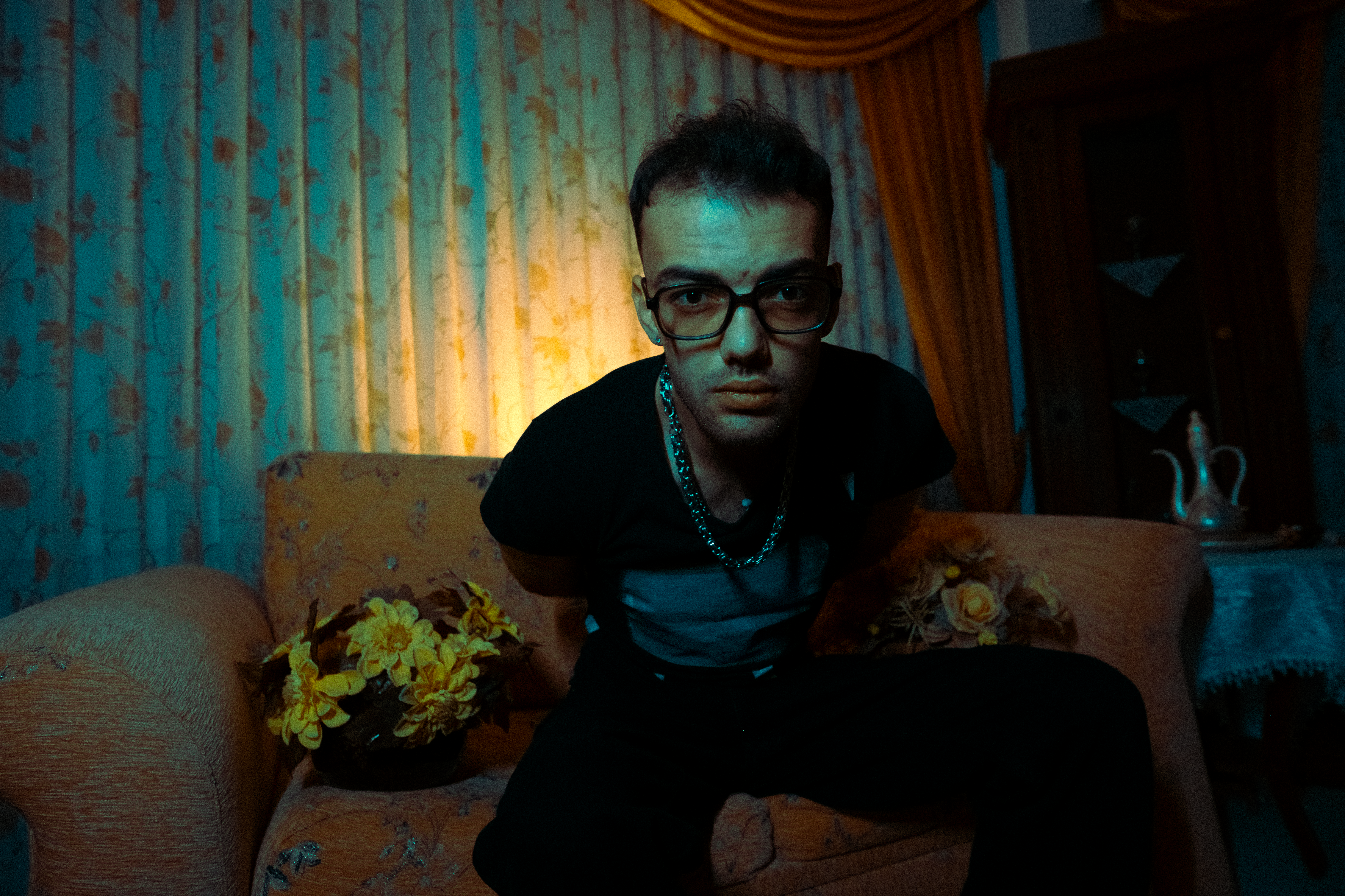 Moody Portrait of Man in Dimly Lit Interior · Free Stock Photo