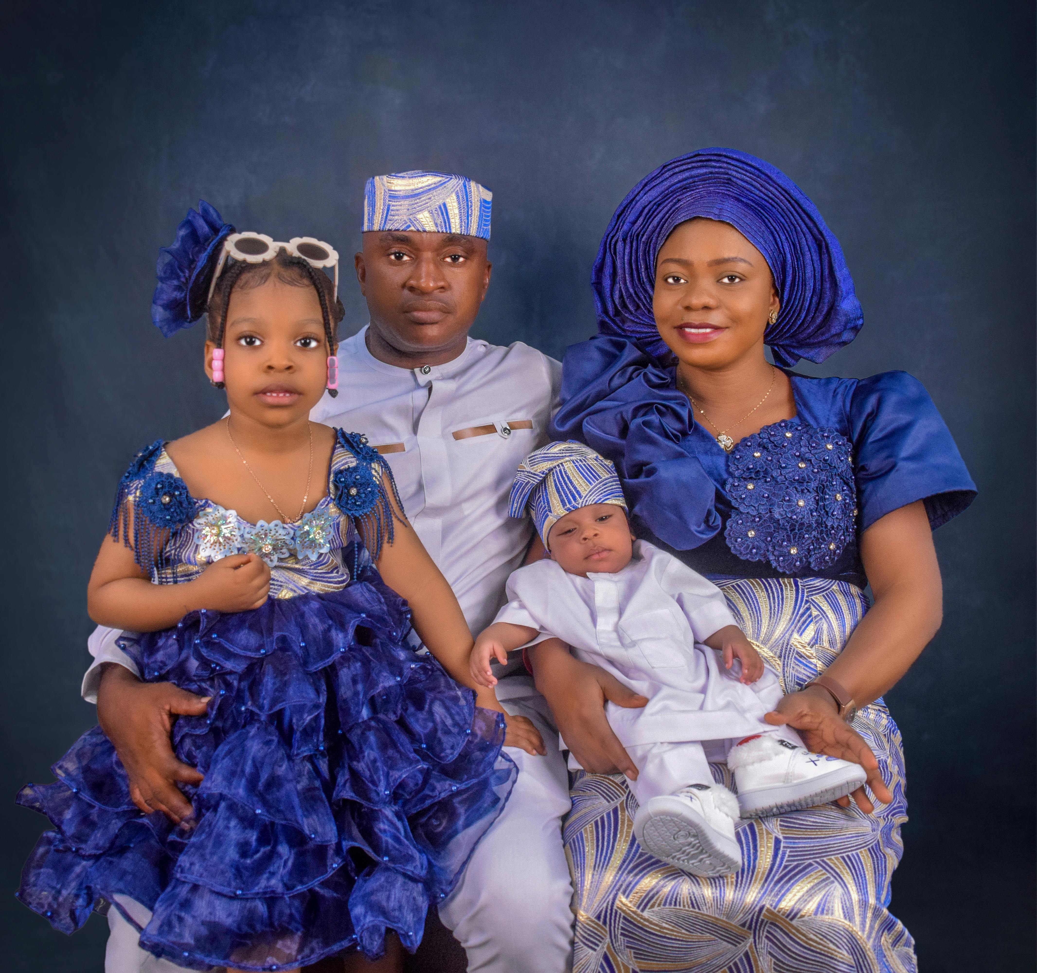 Traditional African Family Portrait in Formal Attire · Free Stock Photo
