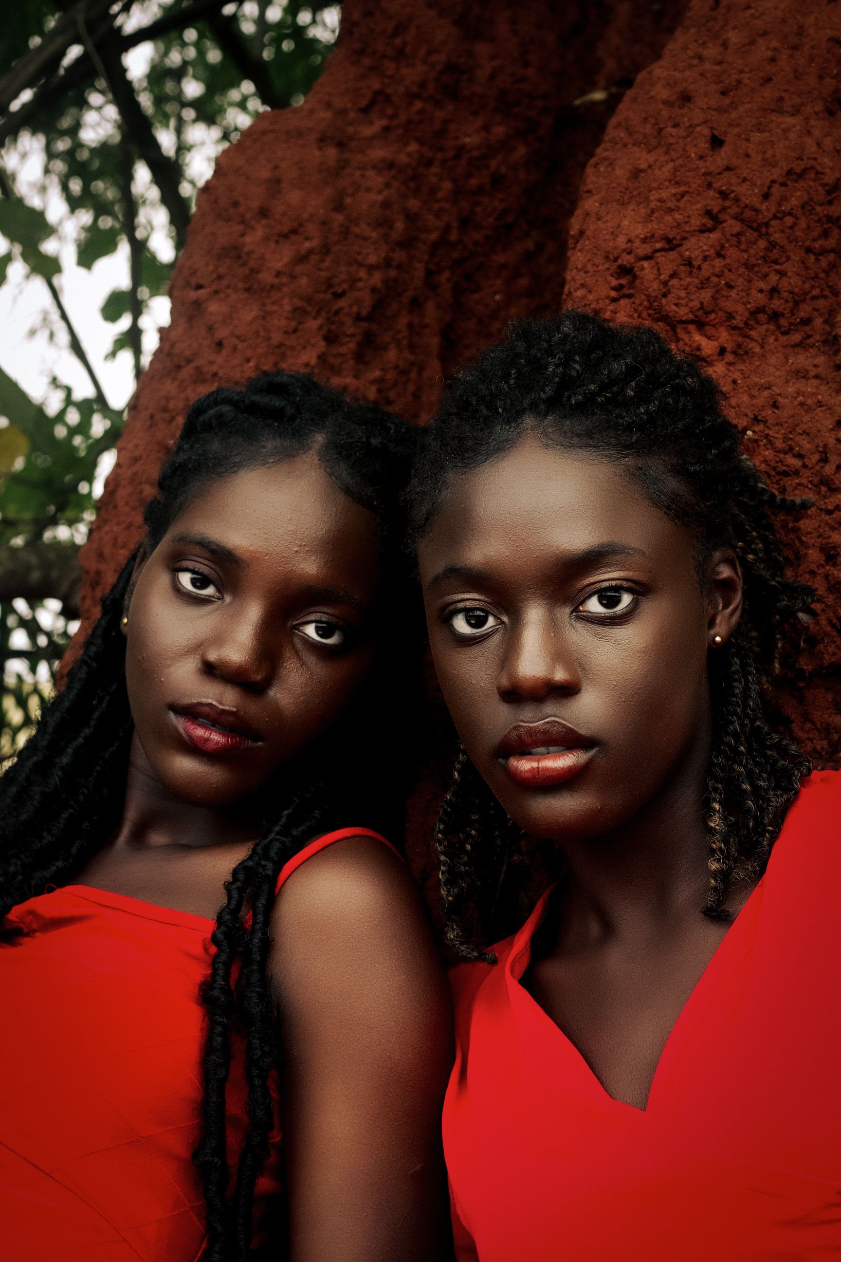 Portrait of Two Women in Bold Red Outfits Outdoors · Free Stock Photo